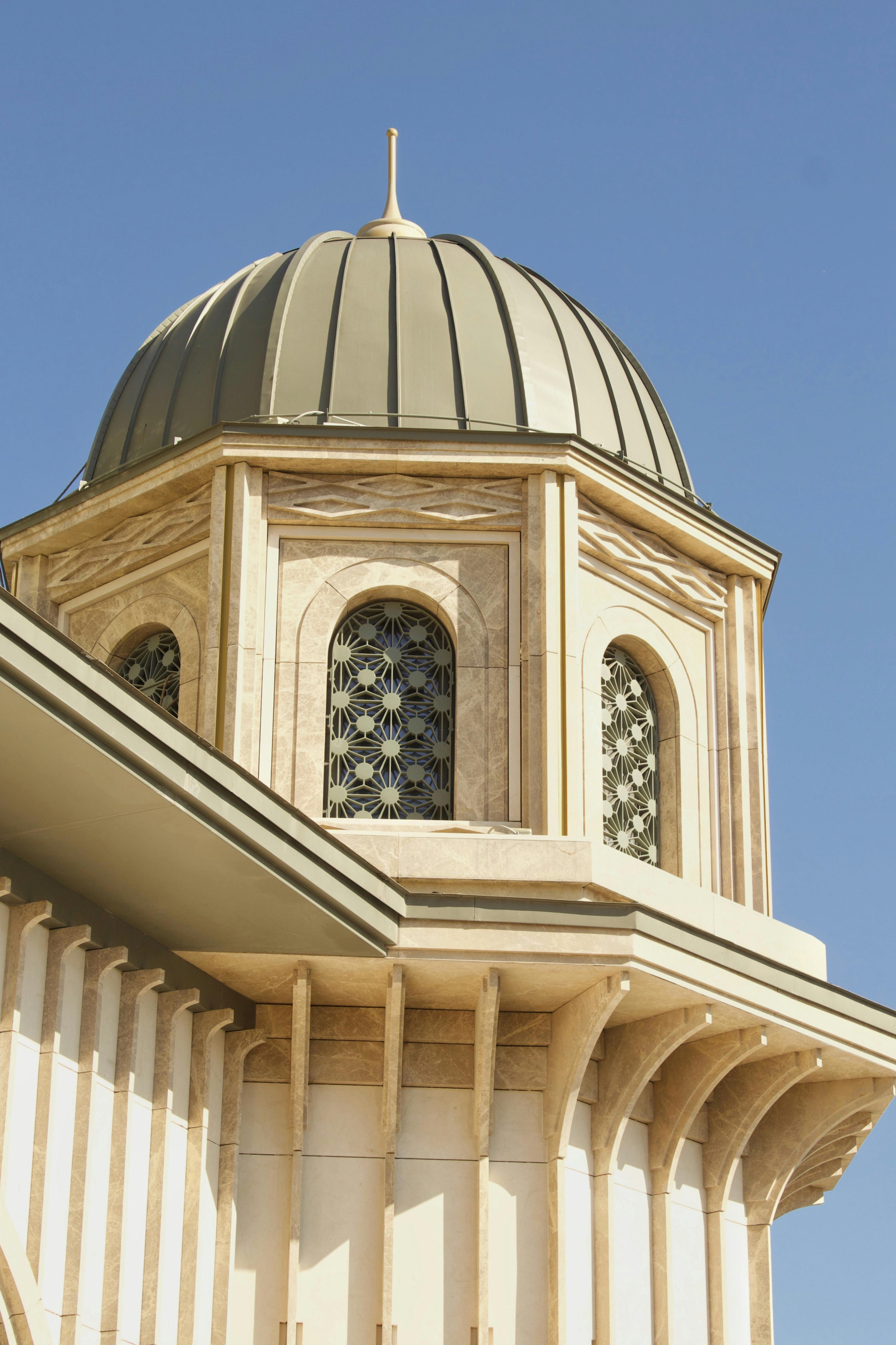 Stone Mosque Dome against Blue Sky · Free Stock Photo