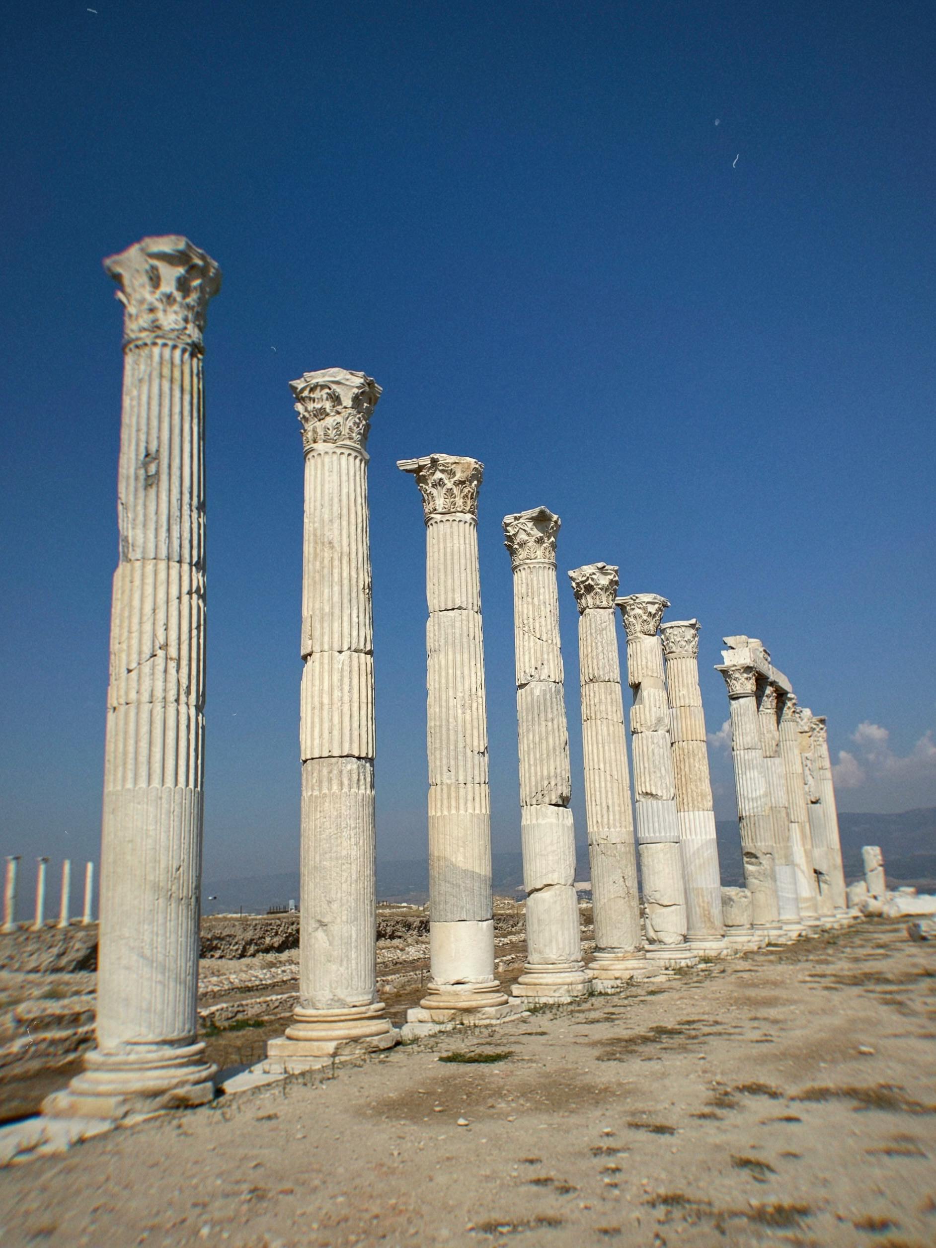 Colonnade of Vintage, Ornamented Columns · Free Stock Photo
