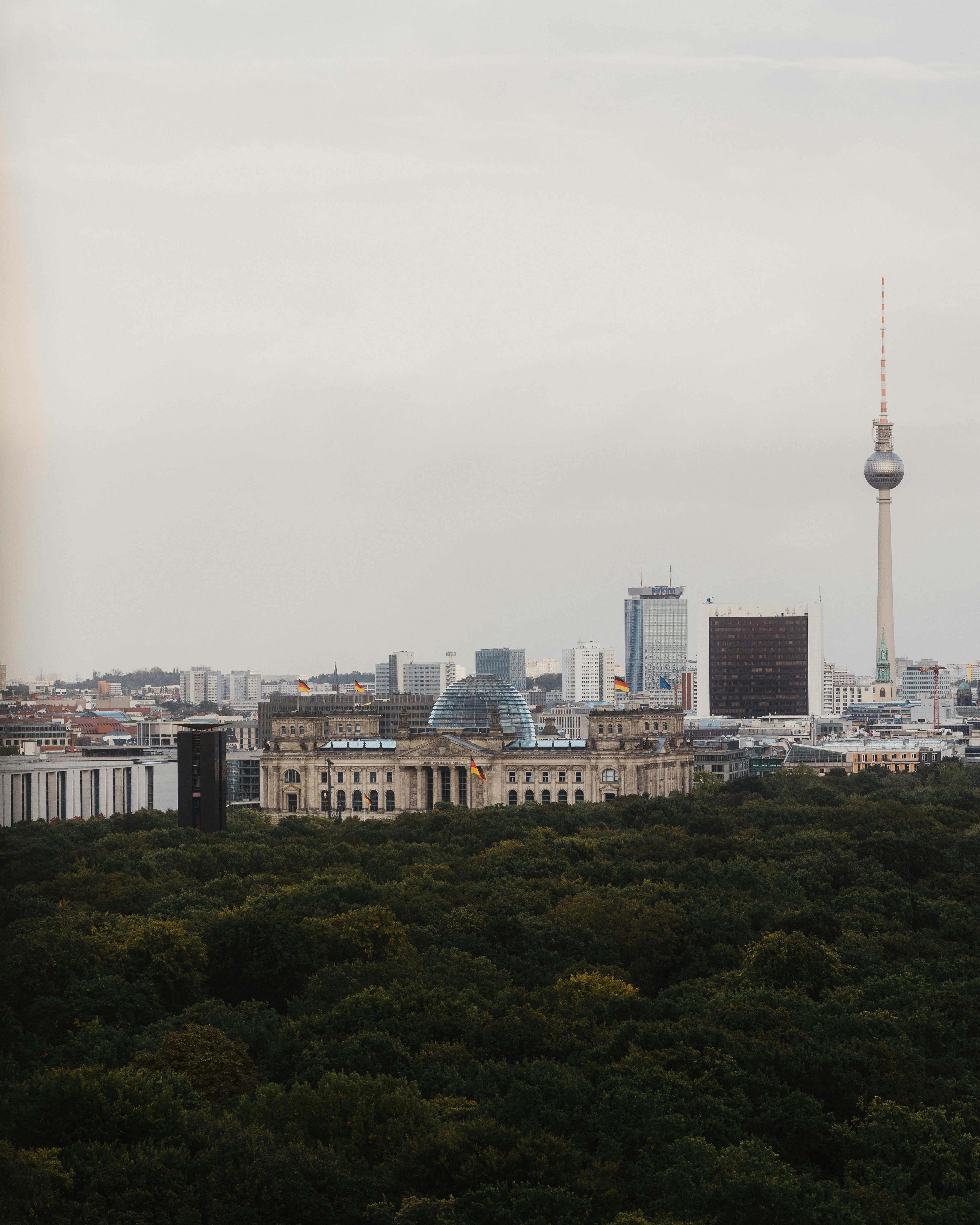 Forest and Berlin Buildings behind · Free Stock Photo