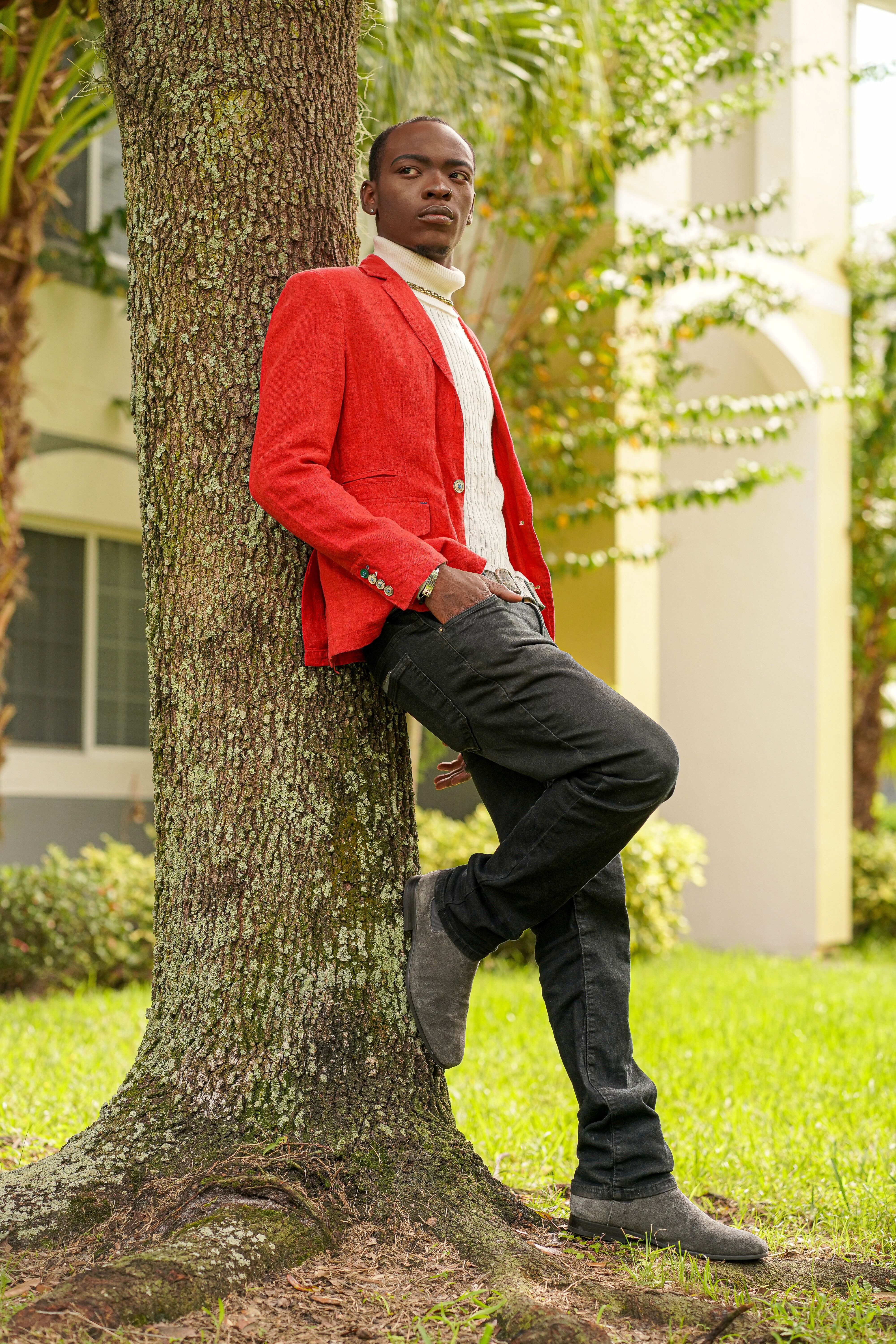 Elegant Man Standing by a Tree · Free Stock Photo