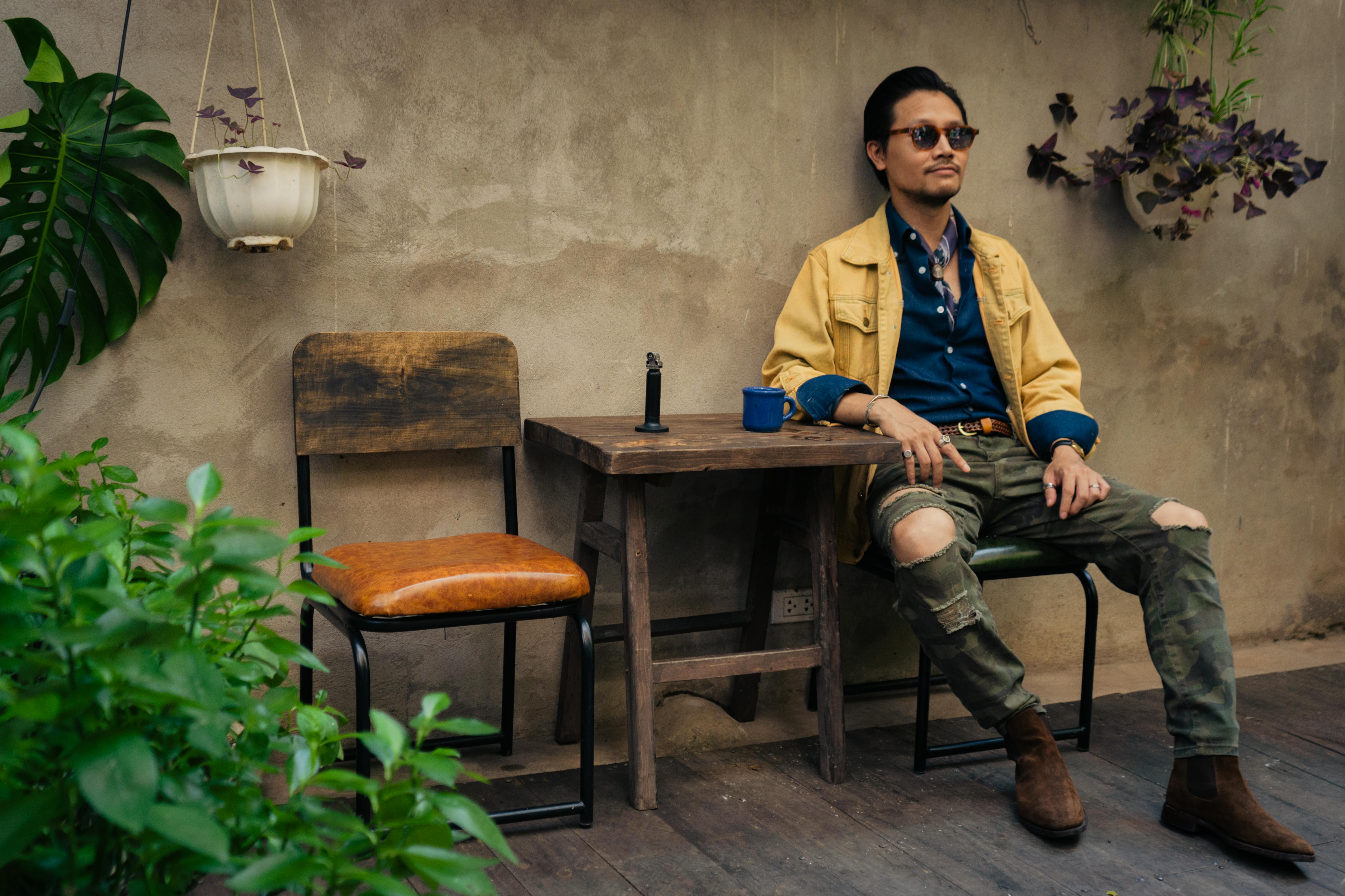 Man in Ripped Jeans and Yellow Jacket · Free Stock Photo