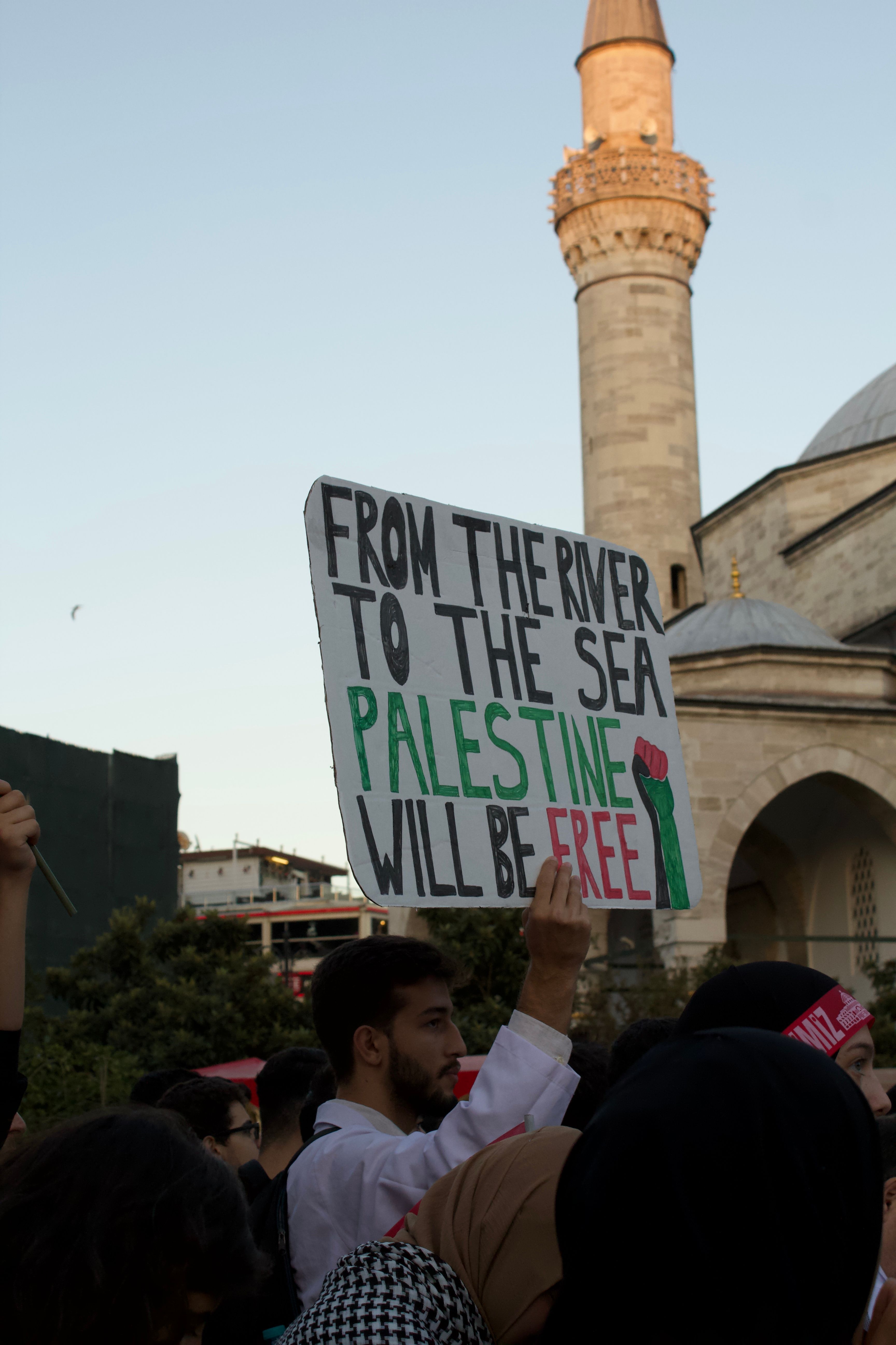 Man Protesting with Banner · Free Stock Photo