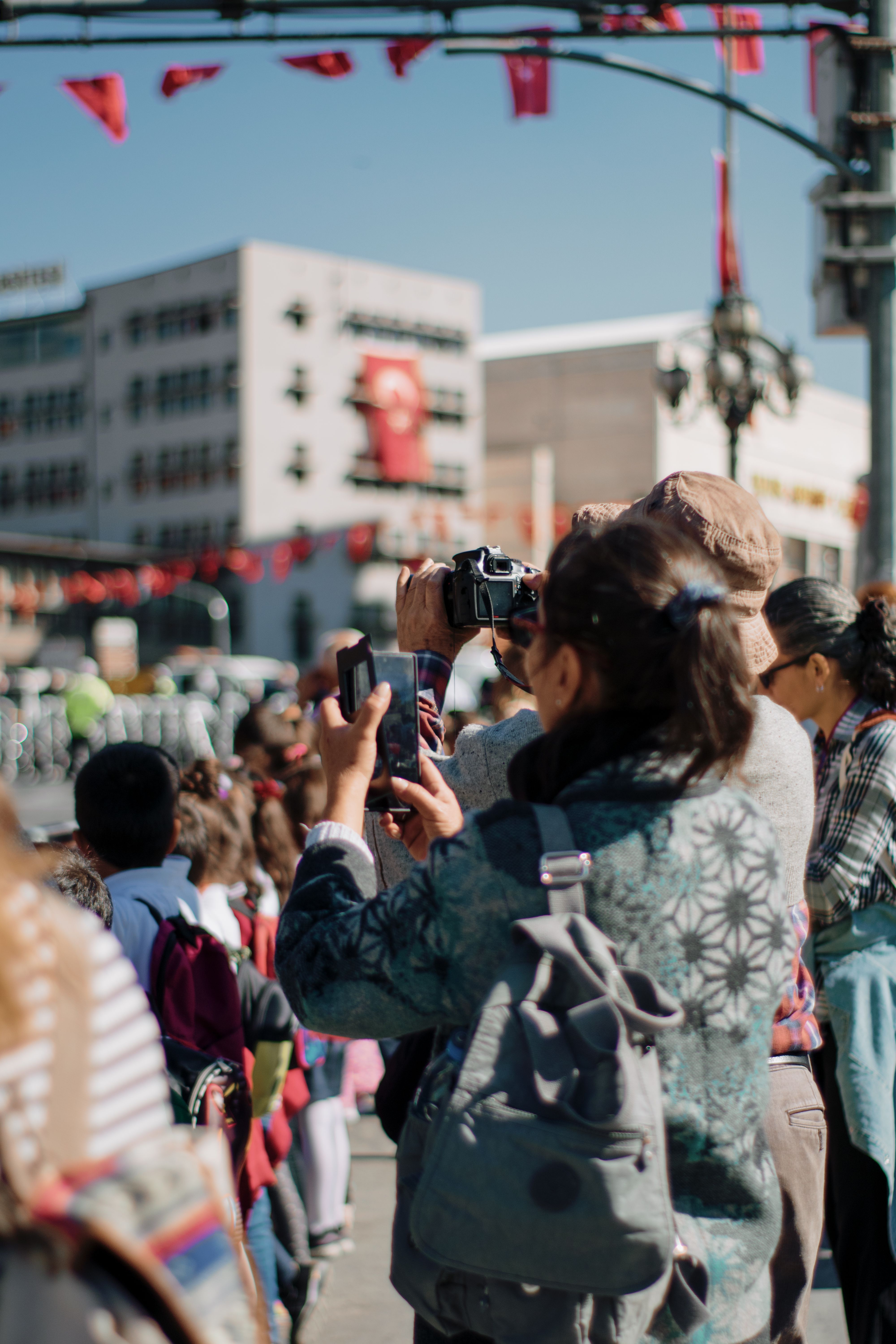 People Taking Photos at a Street Festivity in Turkey · Free Stock Photo