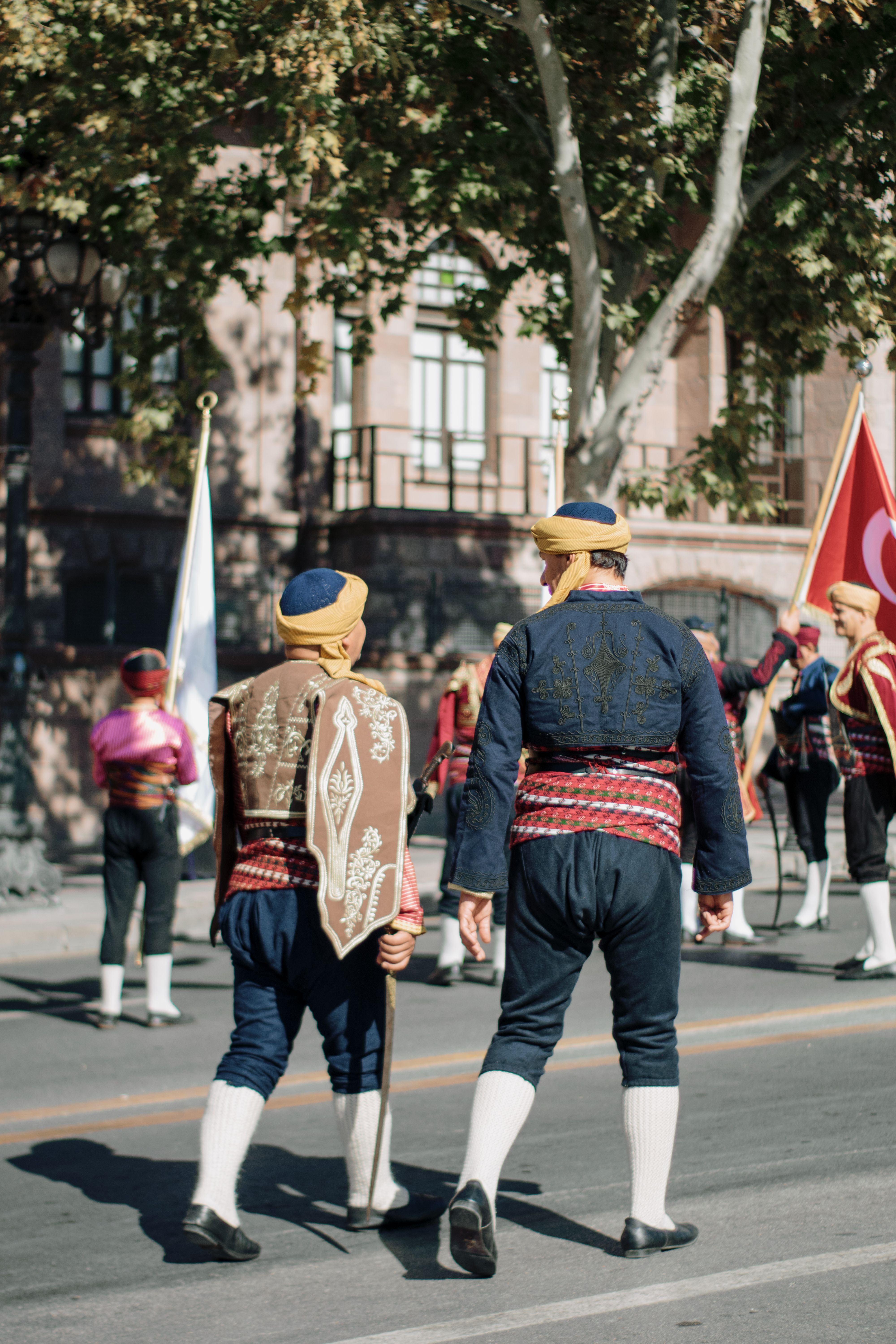 Men in Traditional Turkish Clothing Walking on a Street at a Parade ...