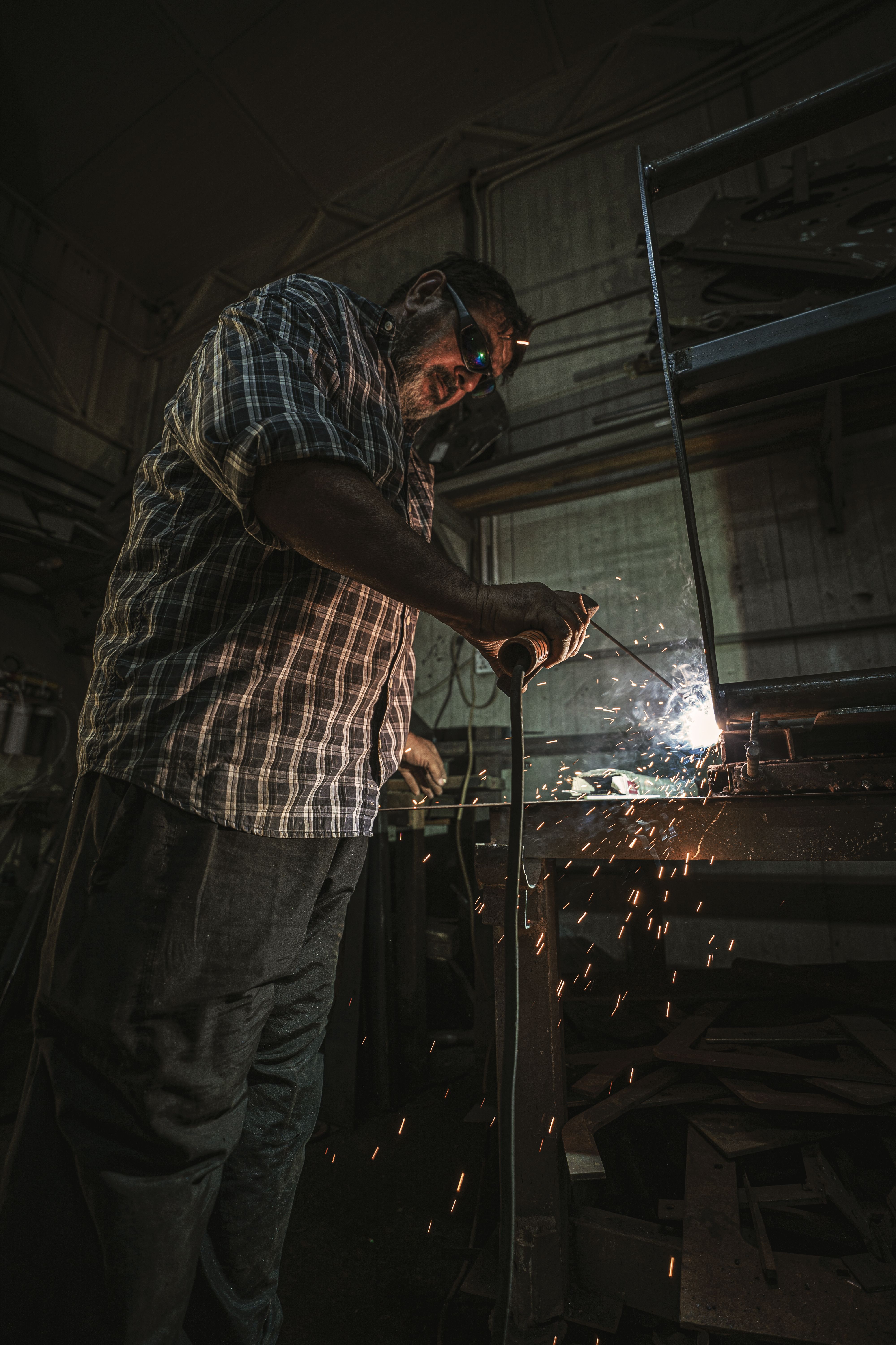 Man Grinding at Workshop · Free Stock Photo