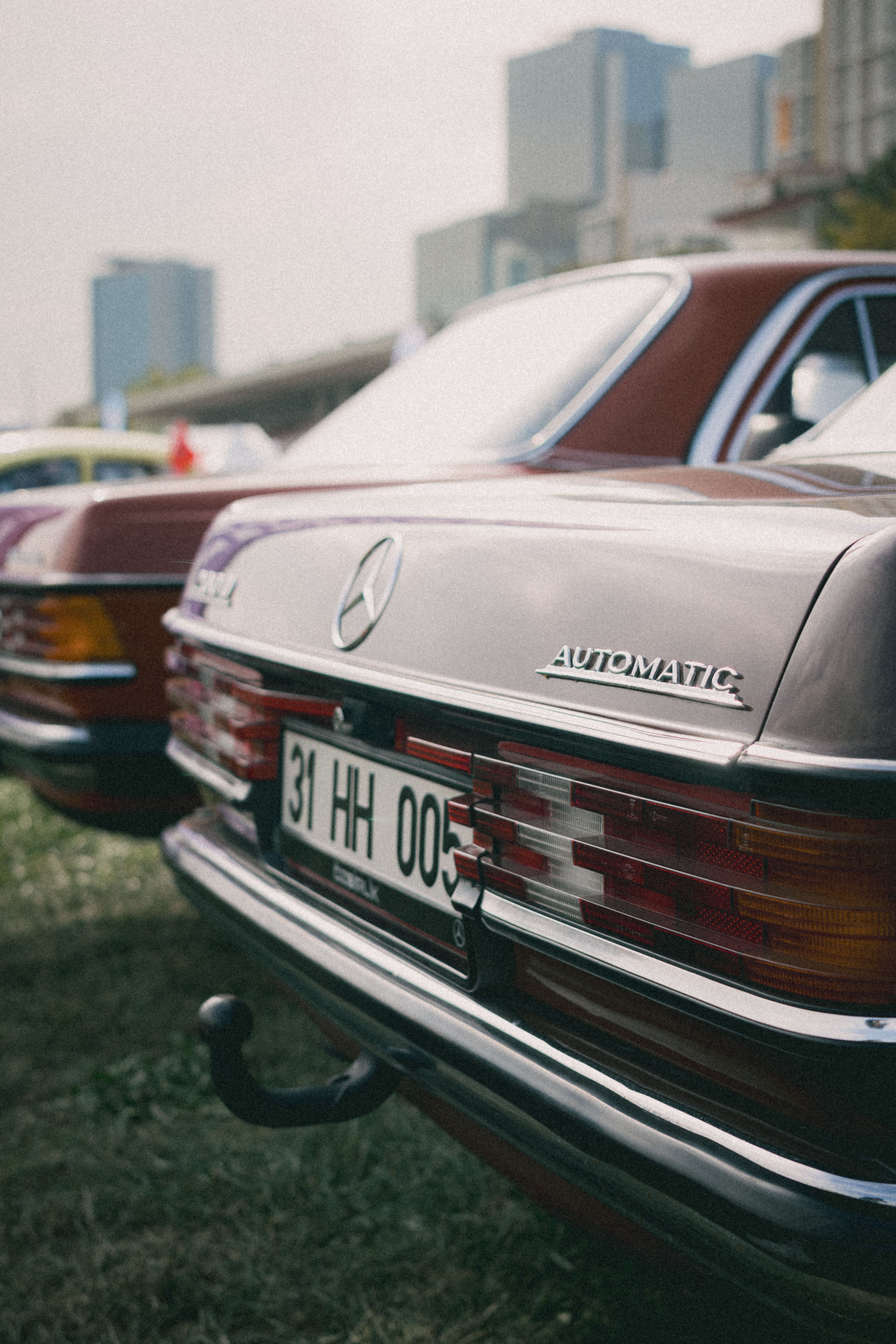 Mercedes W126 Cars Parked in an Indoor Garage · Free Stock Photo