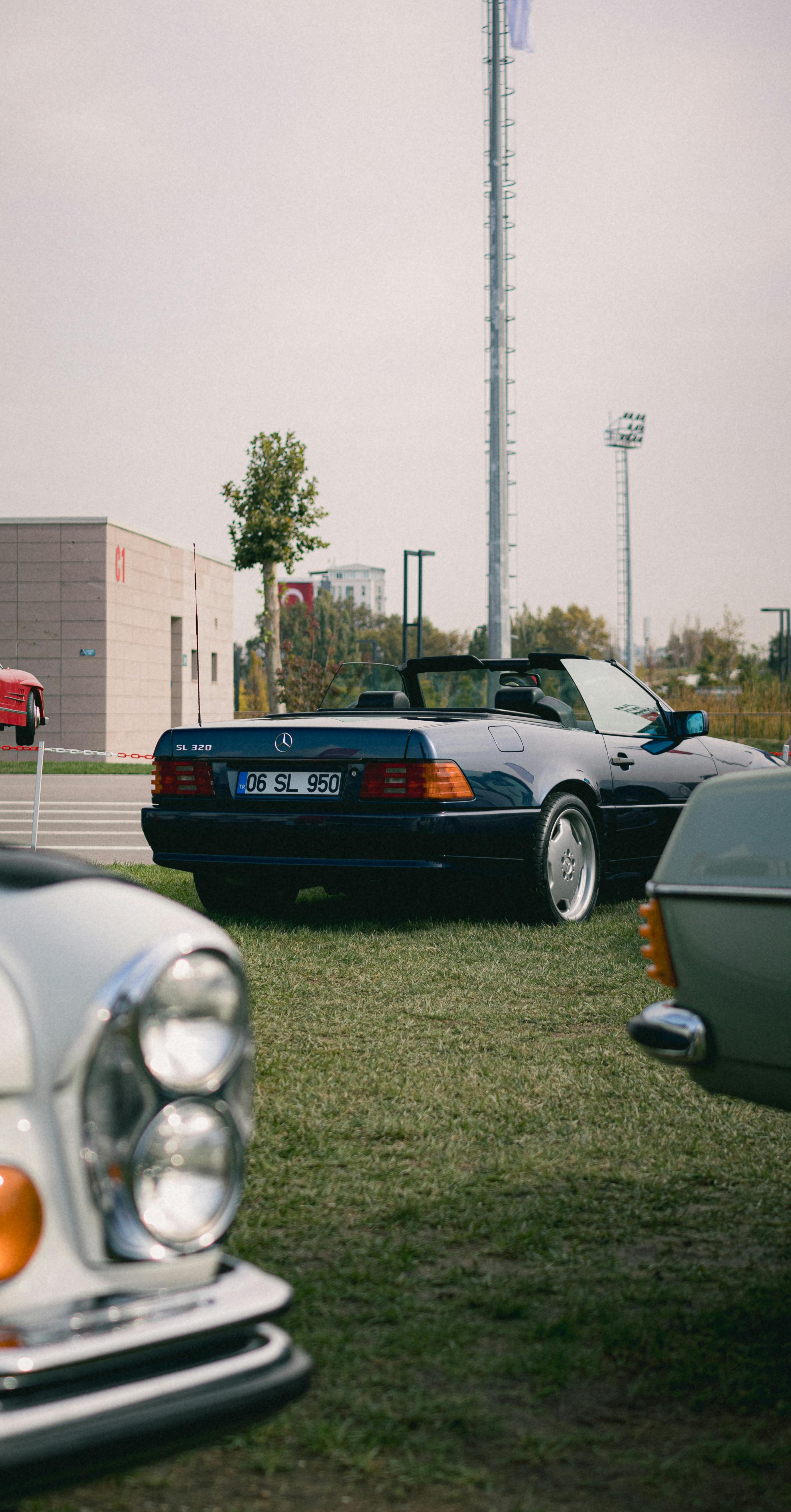 Mercedes-Benz SL73 at Public Show on Grass · Free Stock Photo