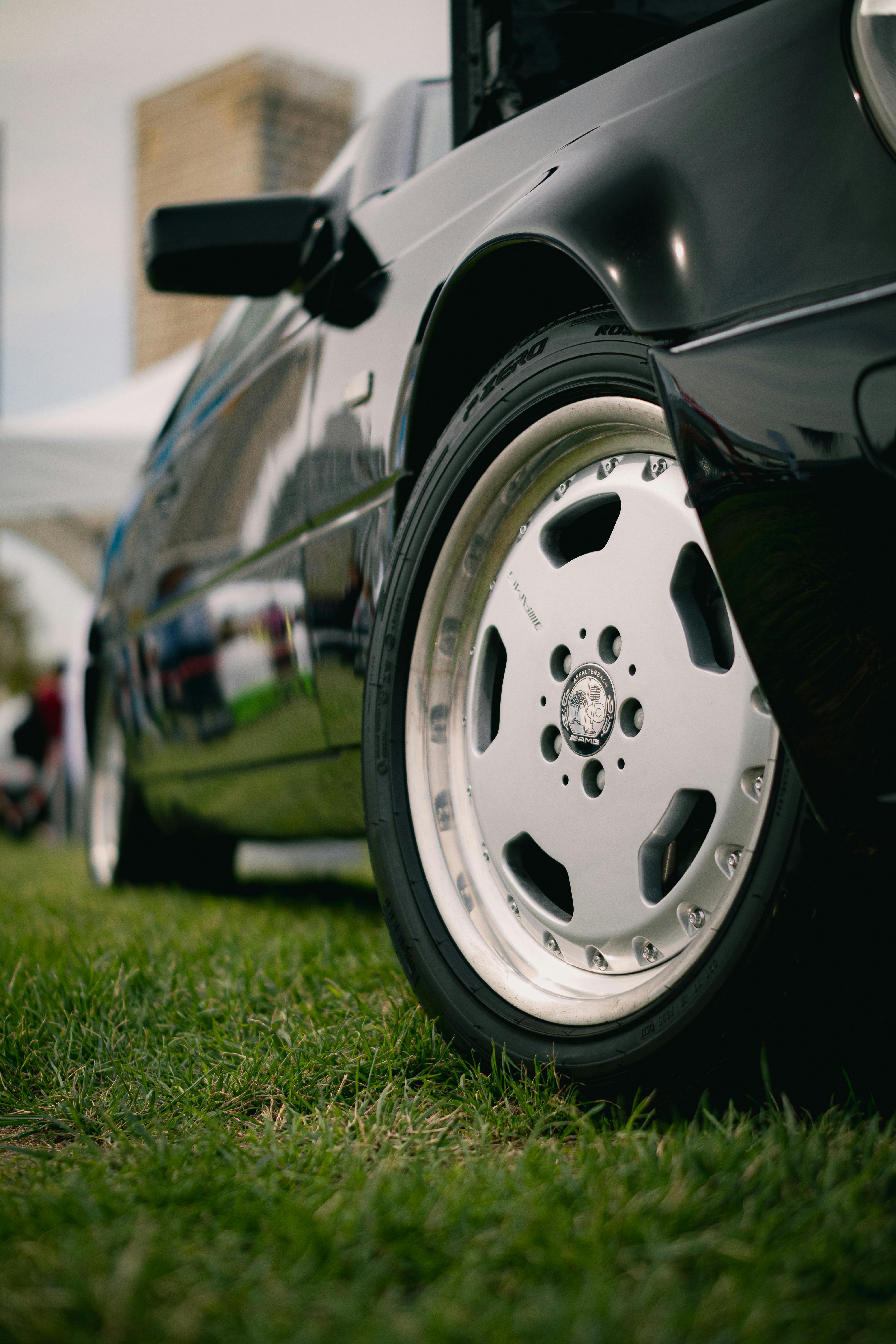 Close-up of a Wheel of Mercedes 300CE at a Car Show · Free Stock Photo