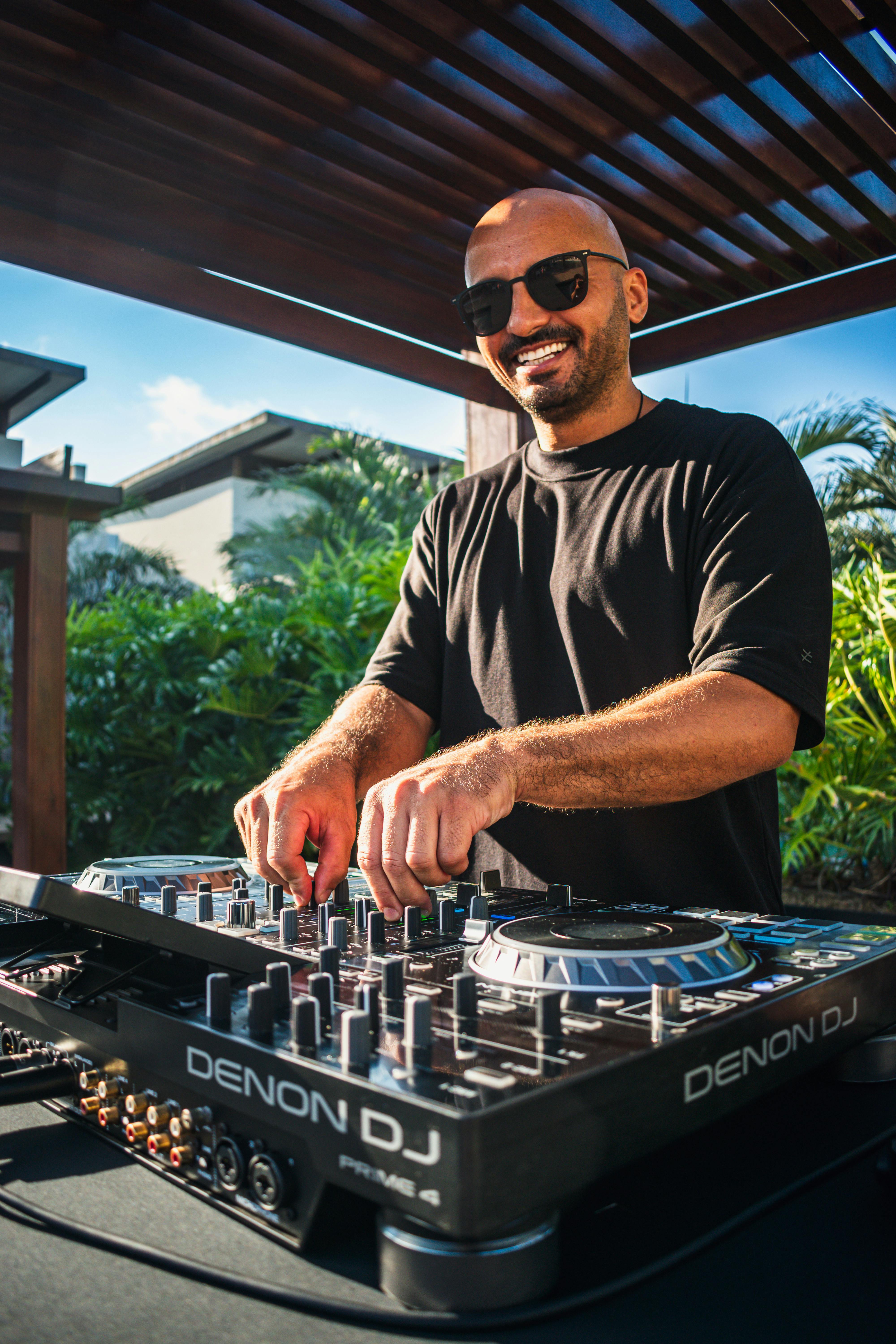 Smiling DJ in Sunglasses · Free Stock Photo