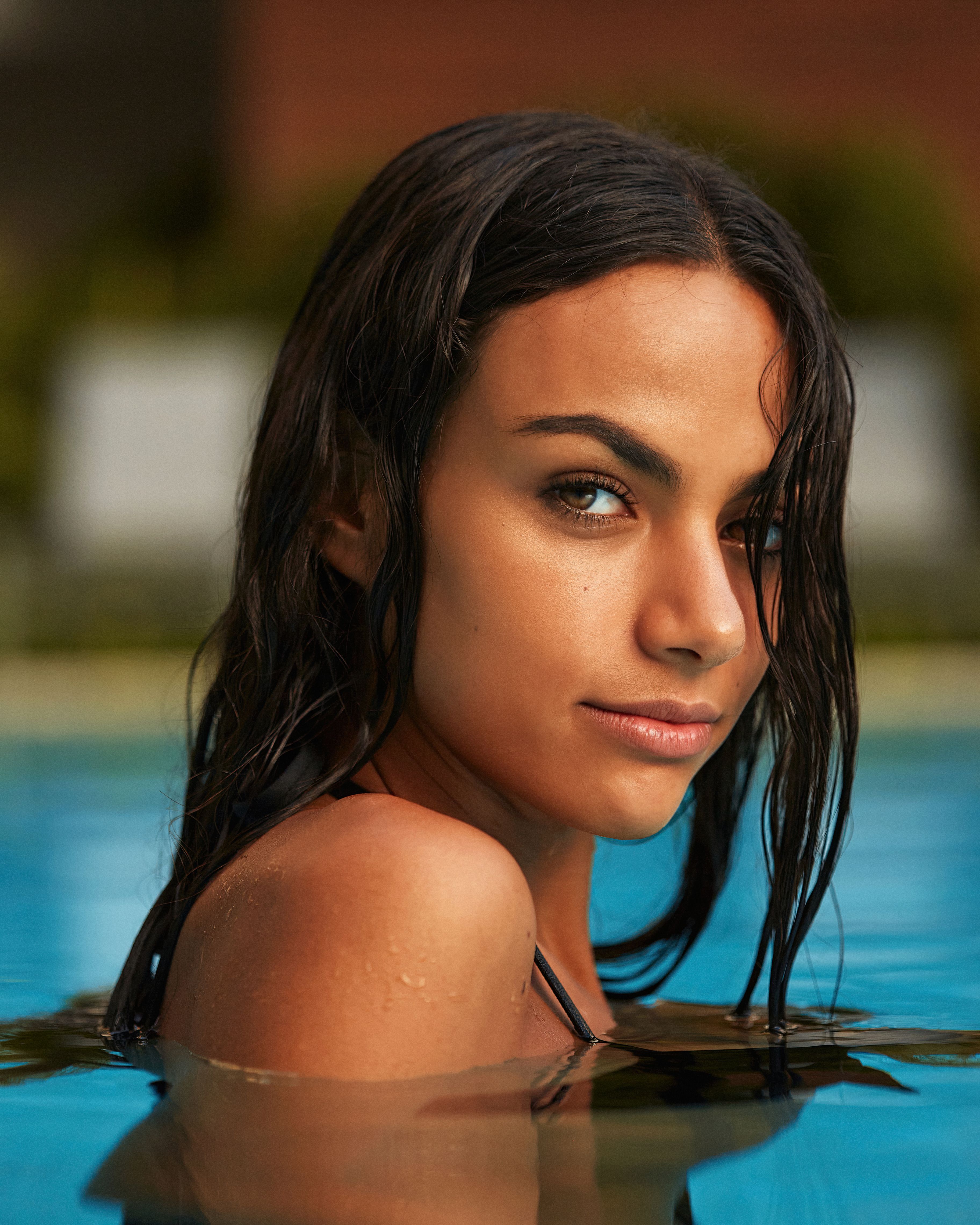 Portrait of a Girl in a Pool · Free Stock Photo