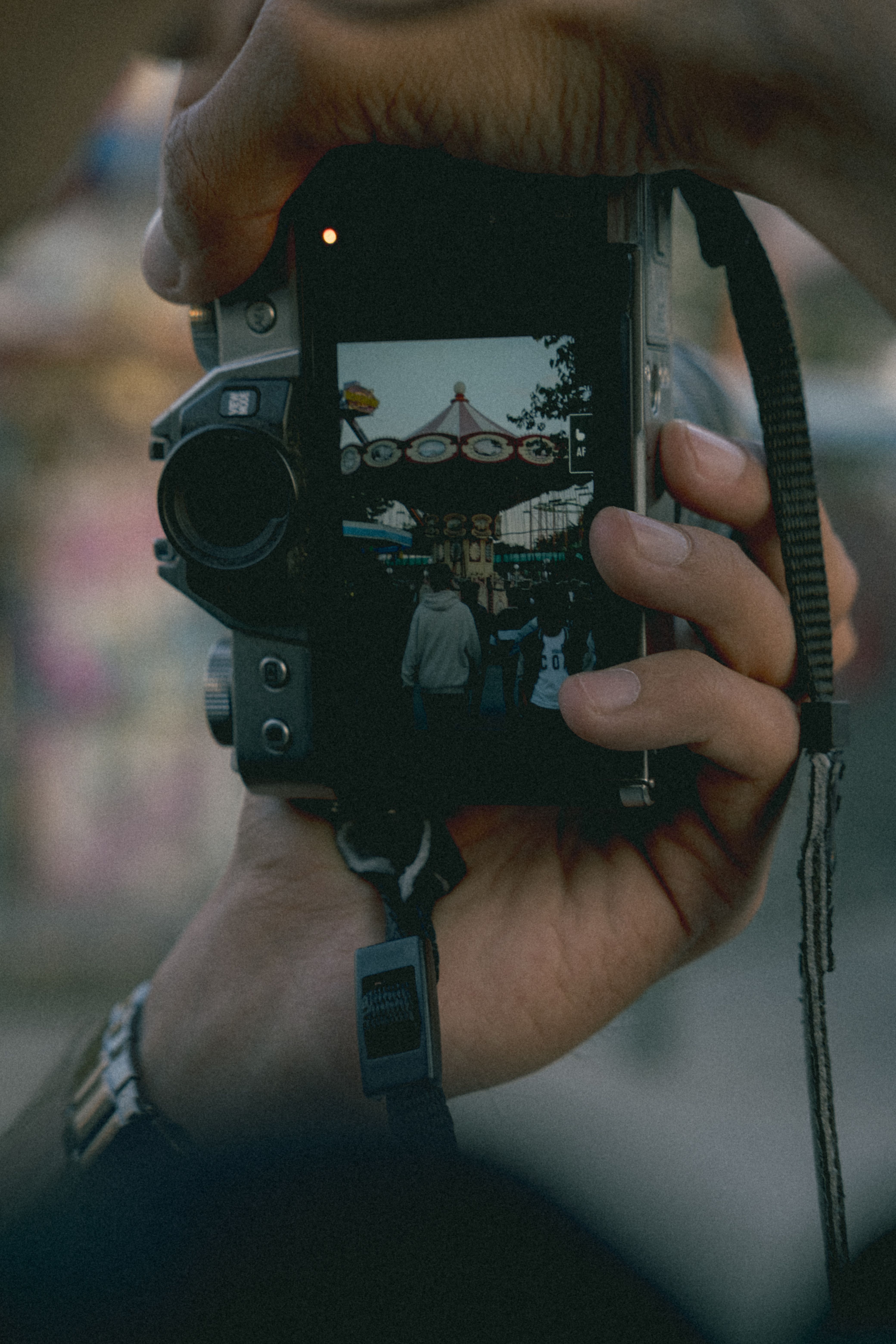 Close-up of a Camera Filming the Audience · Free Stock Photo