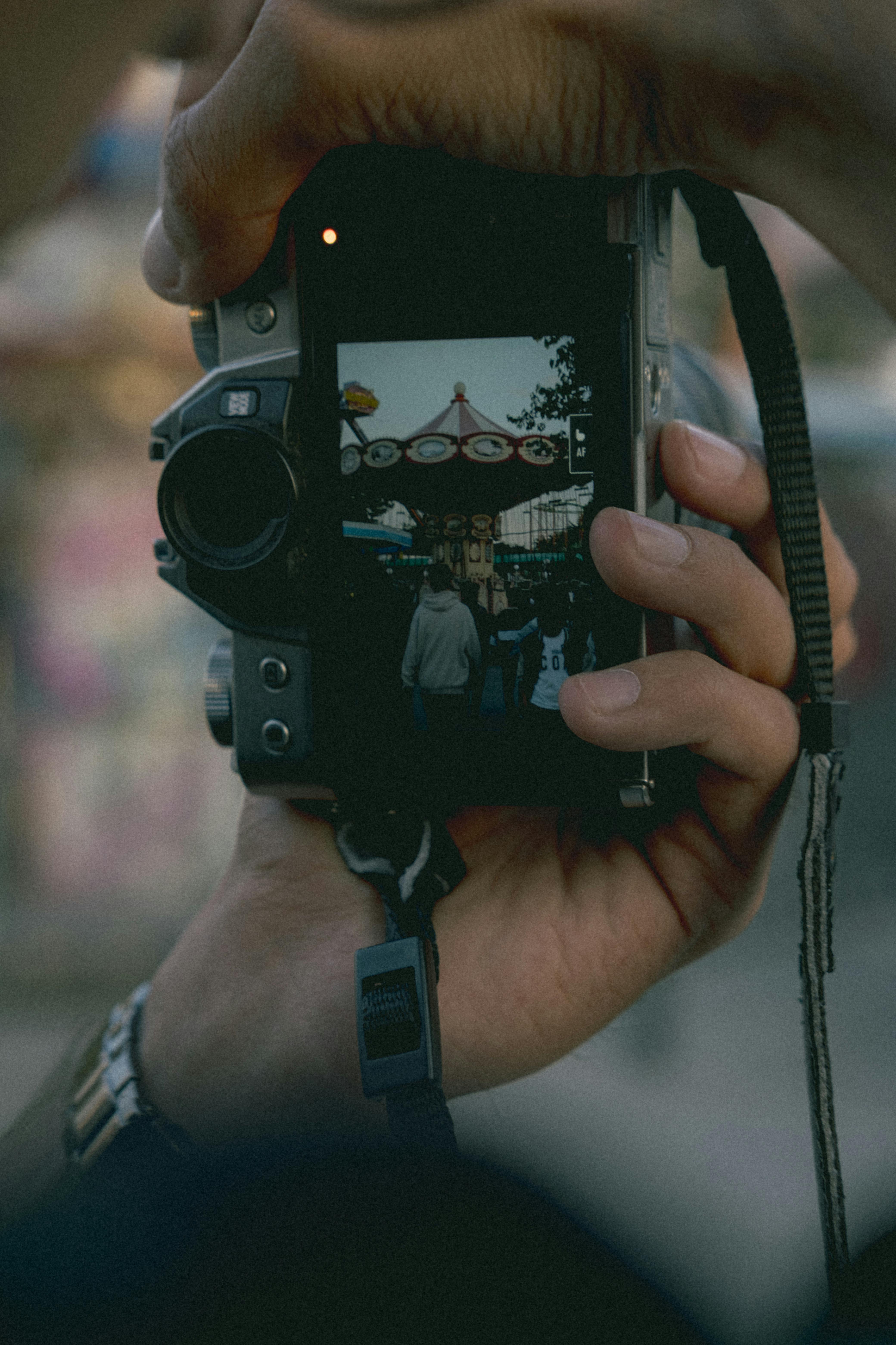 Close-up of a Camera Viewfinder with the View of a Carousel · Free ...