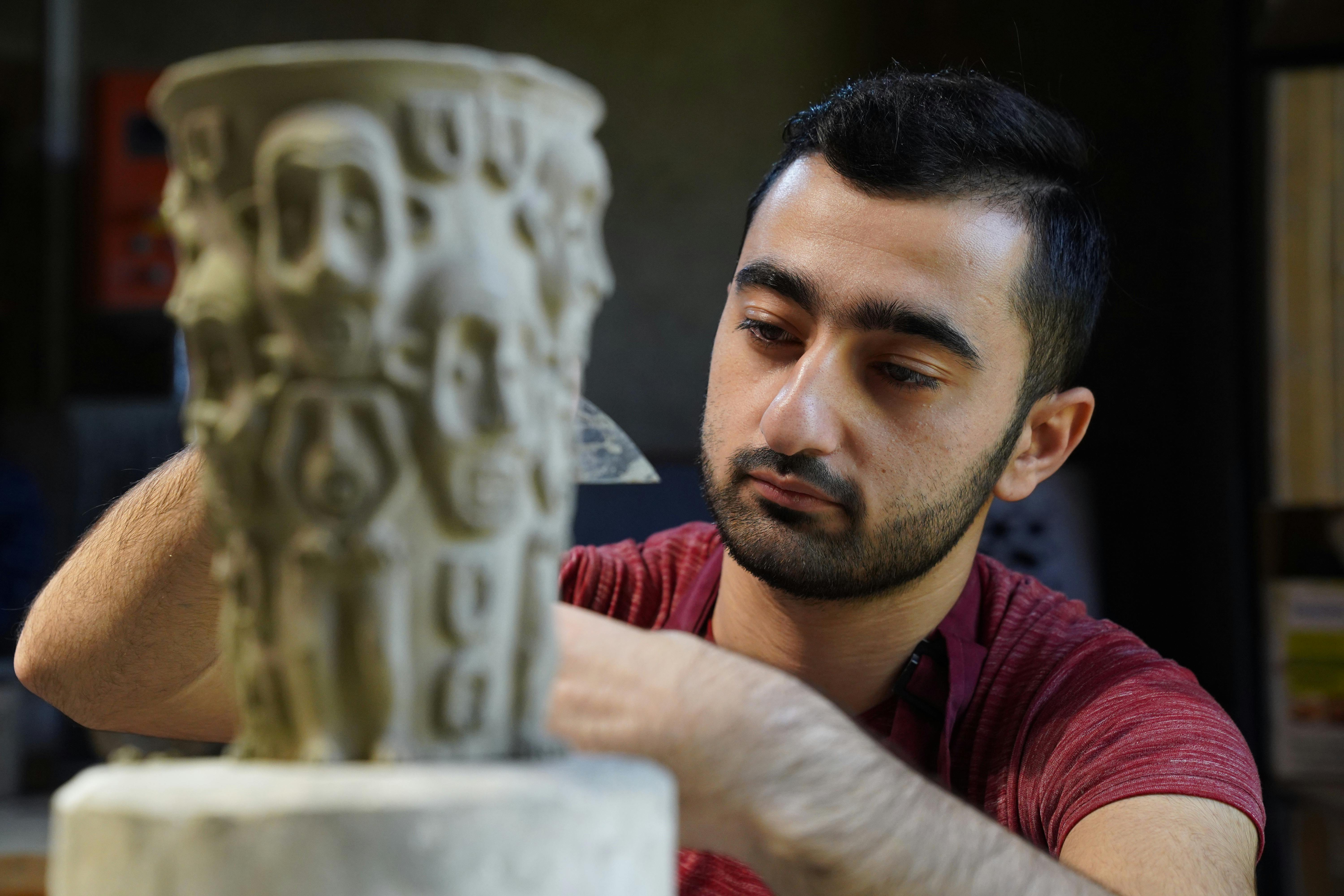 Sculptor Working with Sculpture · Free Stock Photo