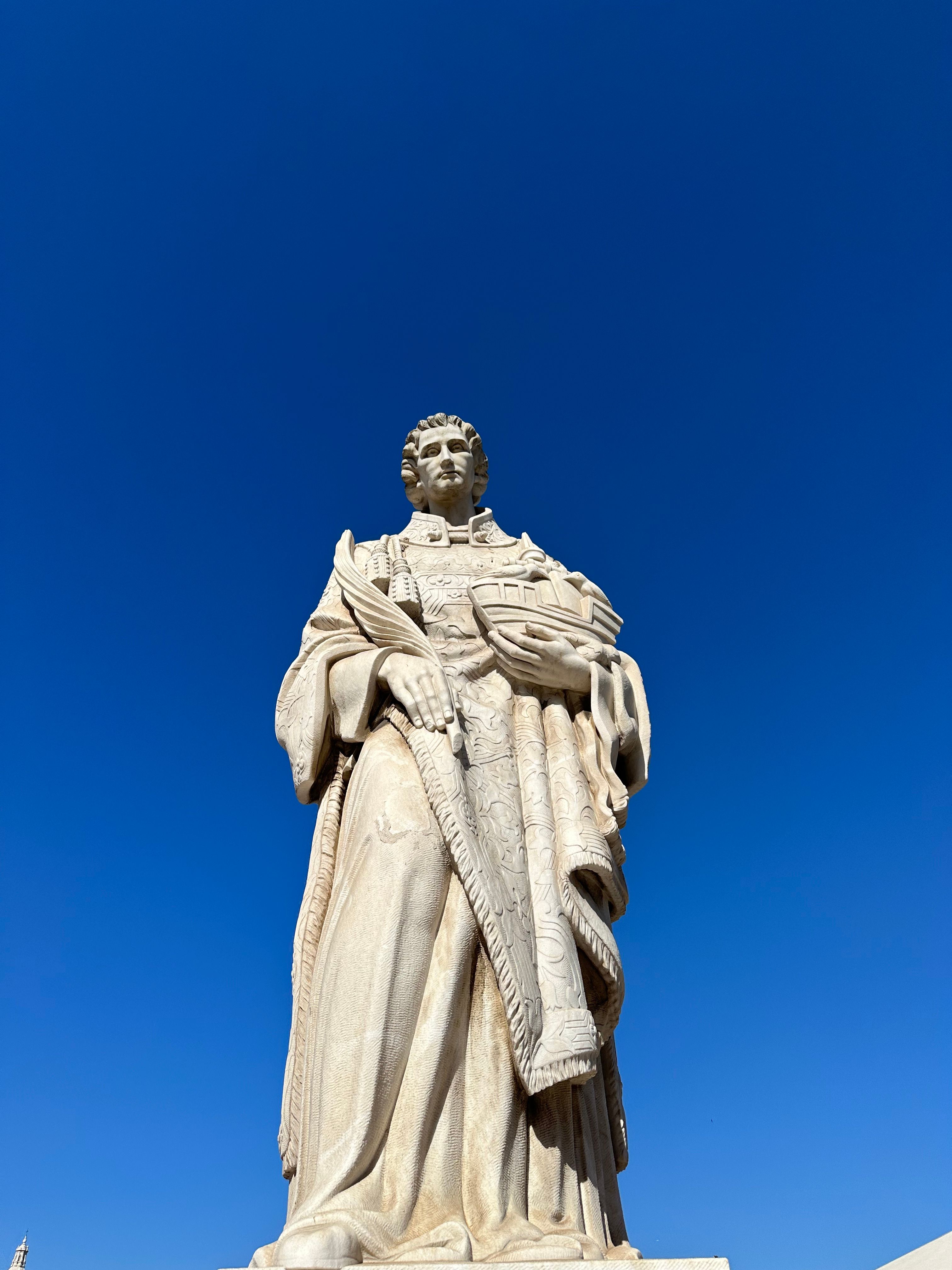 Statue of St. Vincent Standing against a Clear Blue Sky · Free Stock Photo