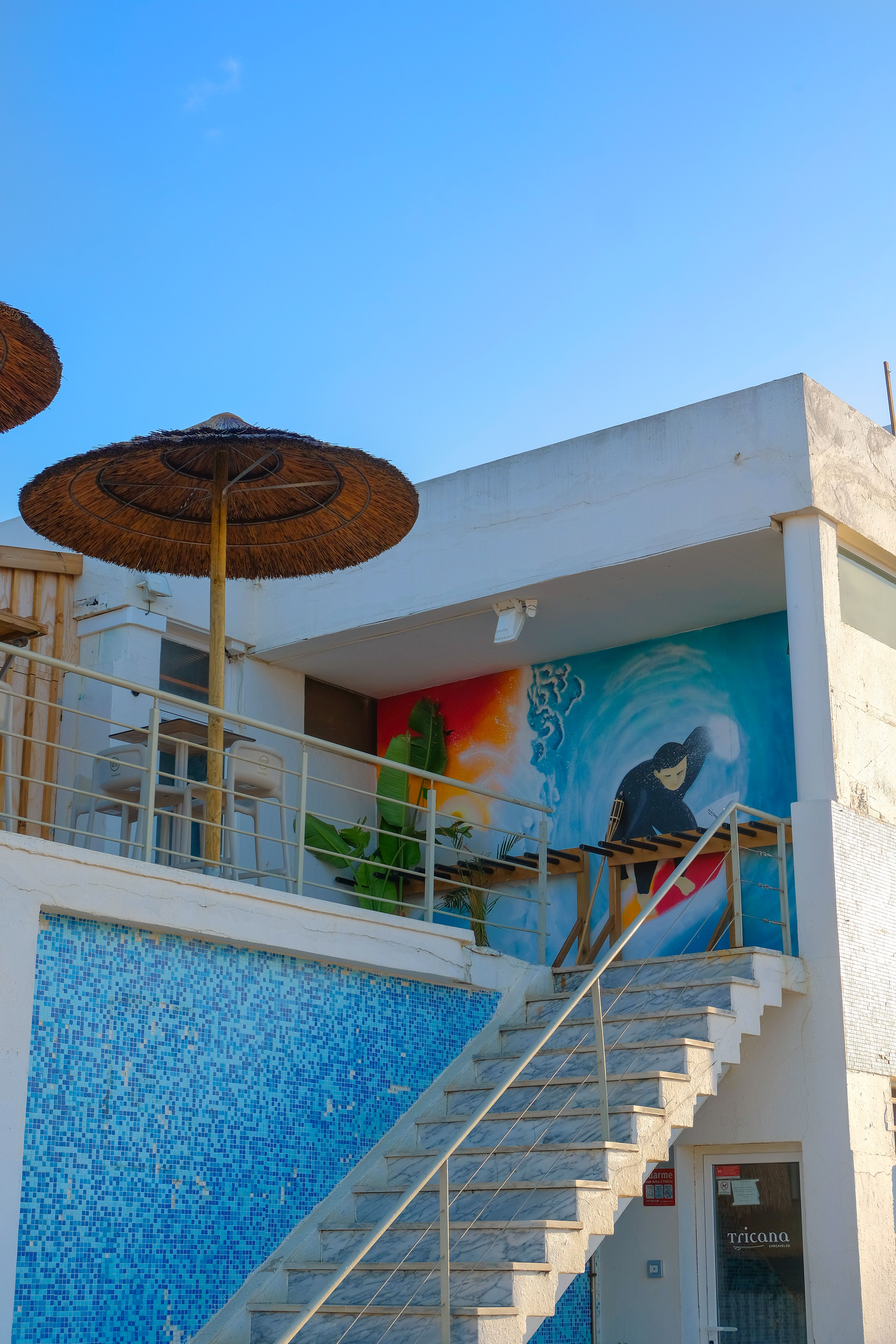 Mural on Wall near Beach Umbrella · Free Stock Photo