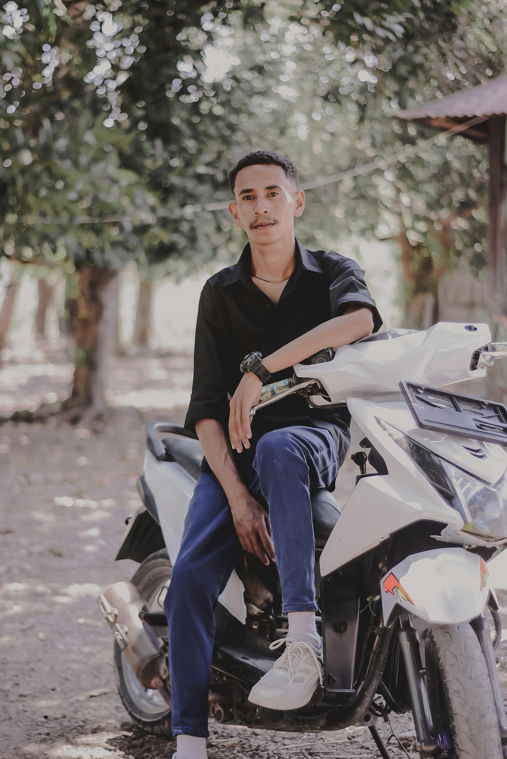 Man Sitting on Motorbike · Free Stock Photo