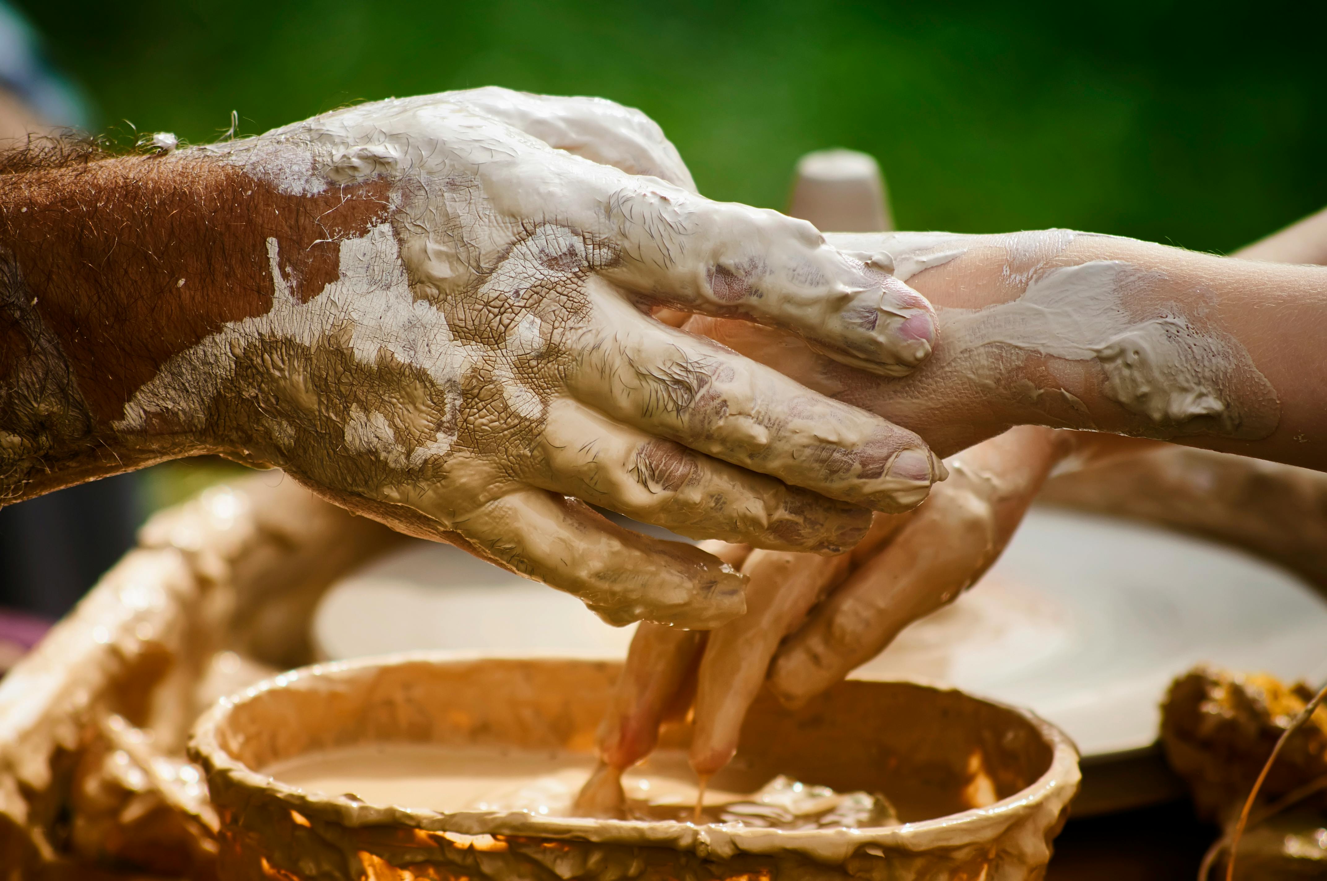 Paint on Hands over Bucket · Free Stock Photo