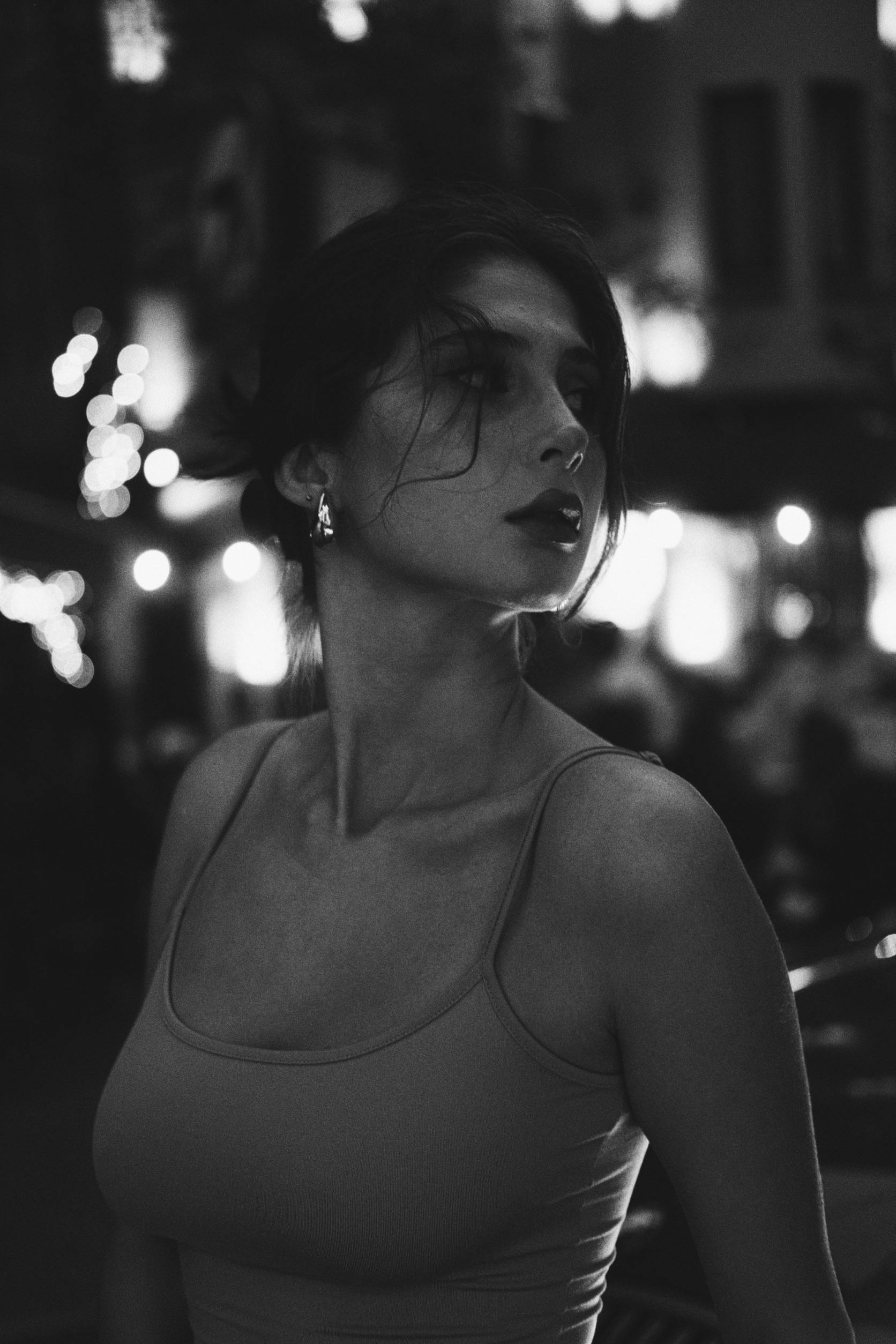 A Woman Wearing a Spaghetti Strap black Dress · Free Stock Photo