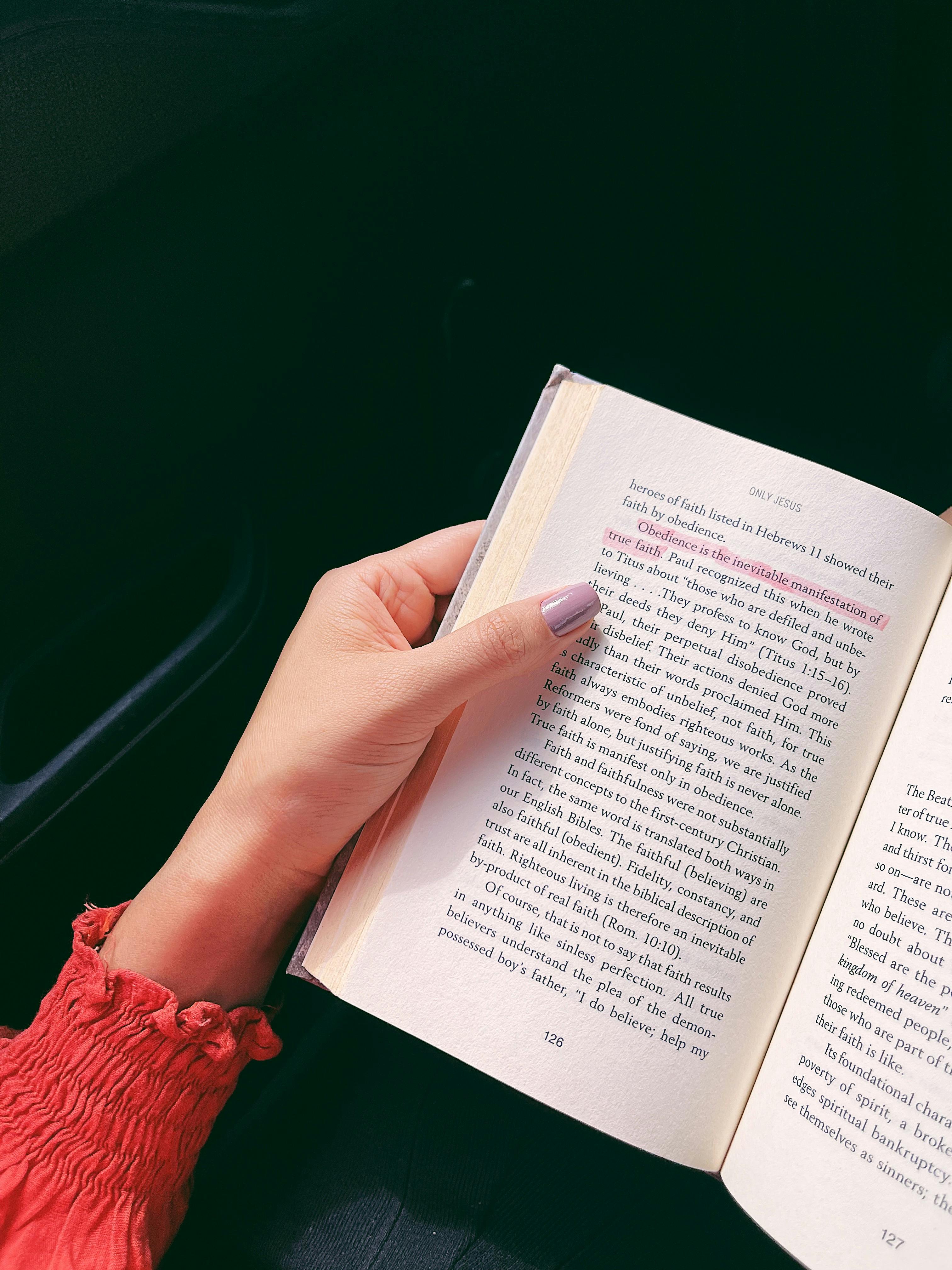 Woman Hand Holding Book · Free Stock Photo