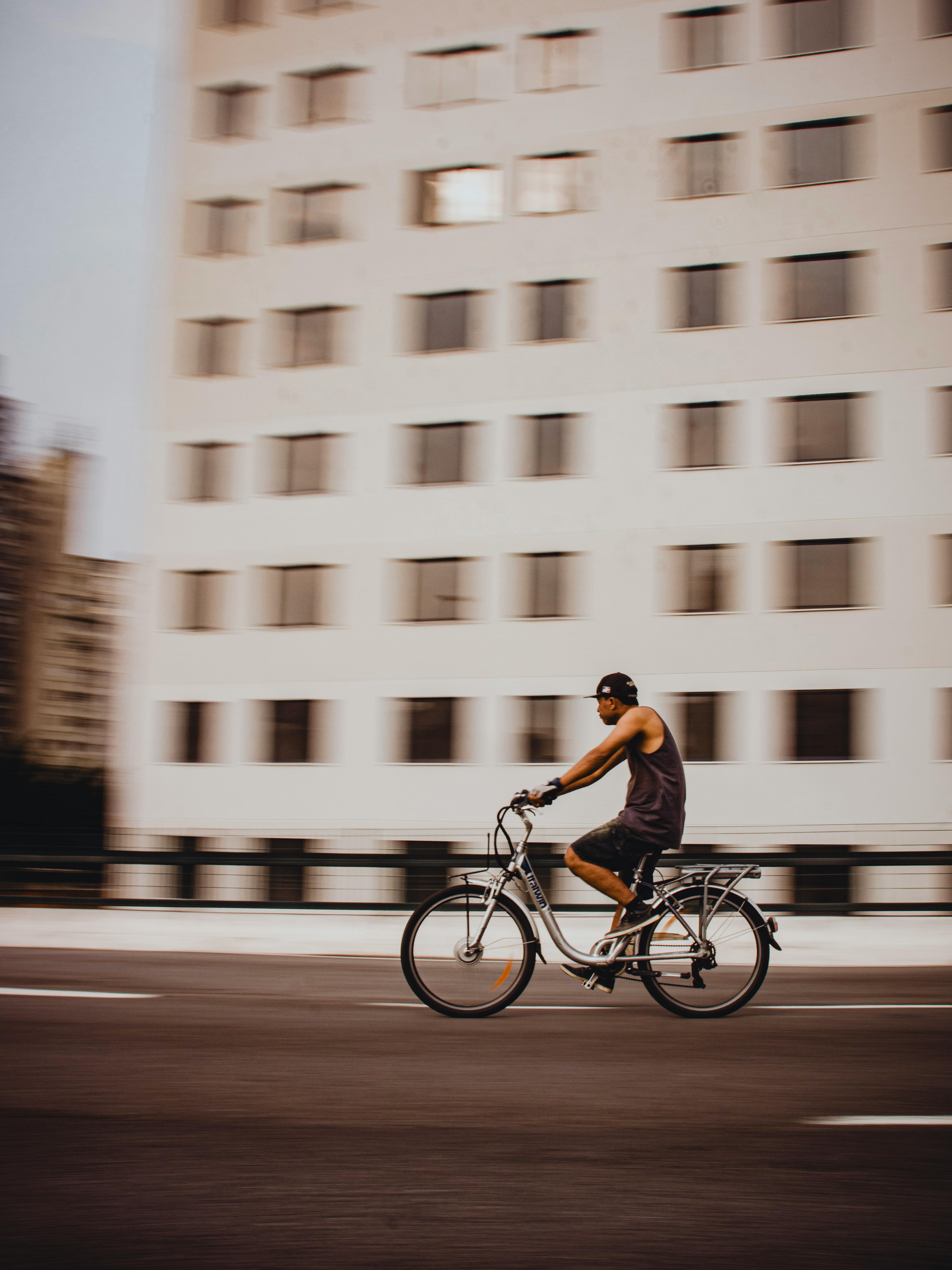 Man on Bike on Street · Free Stock Photo