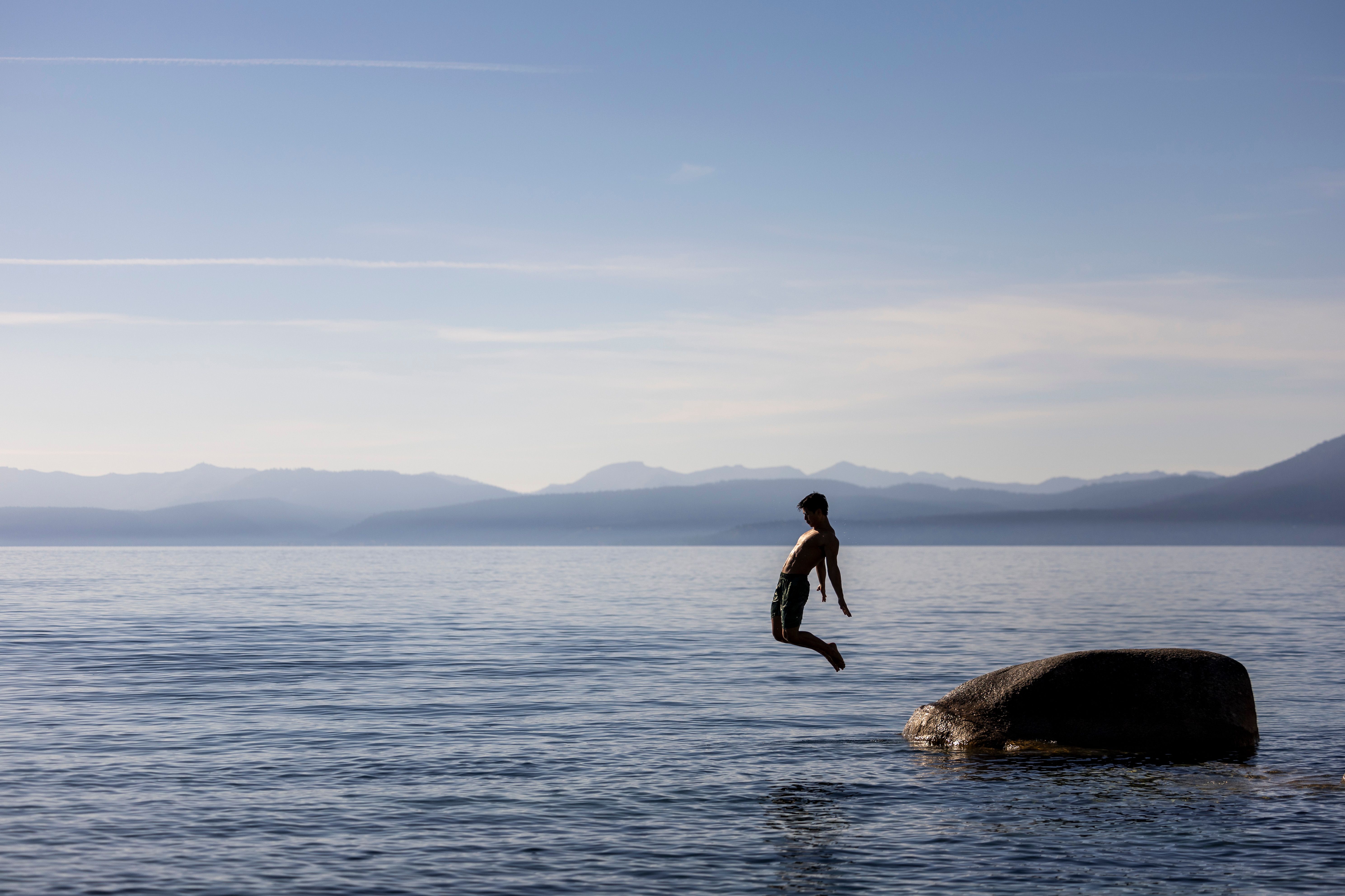 Man Jumping At Rock Photos, Download The BEST Free Man Jumping At Rock ...