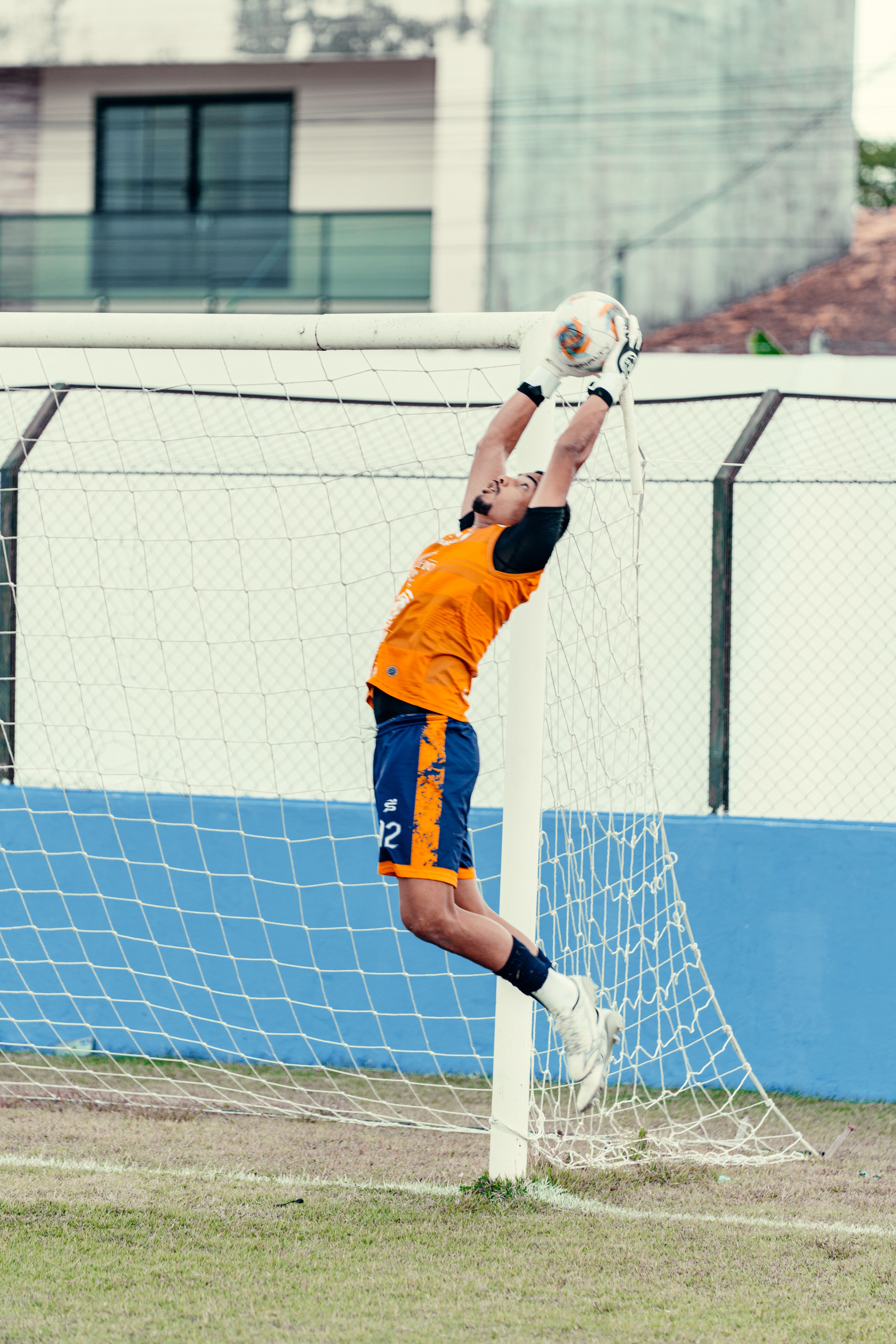 Goalkeeper Saving Ball During Game · Free Stock Photo