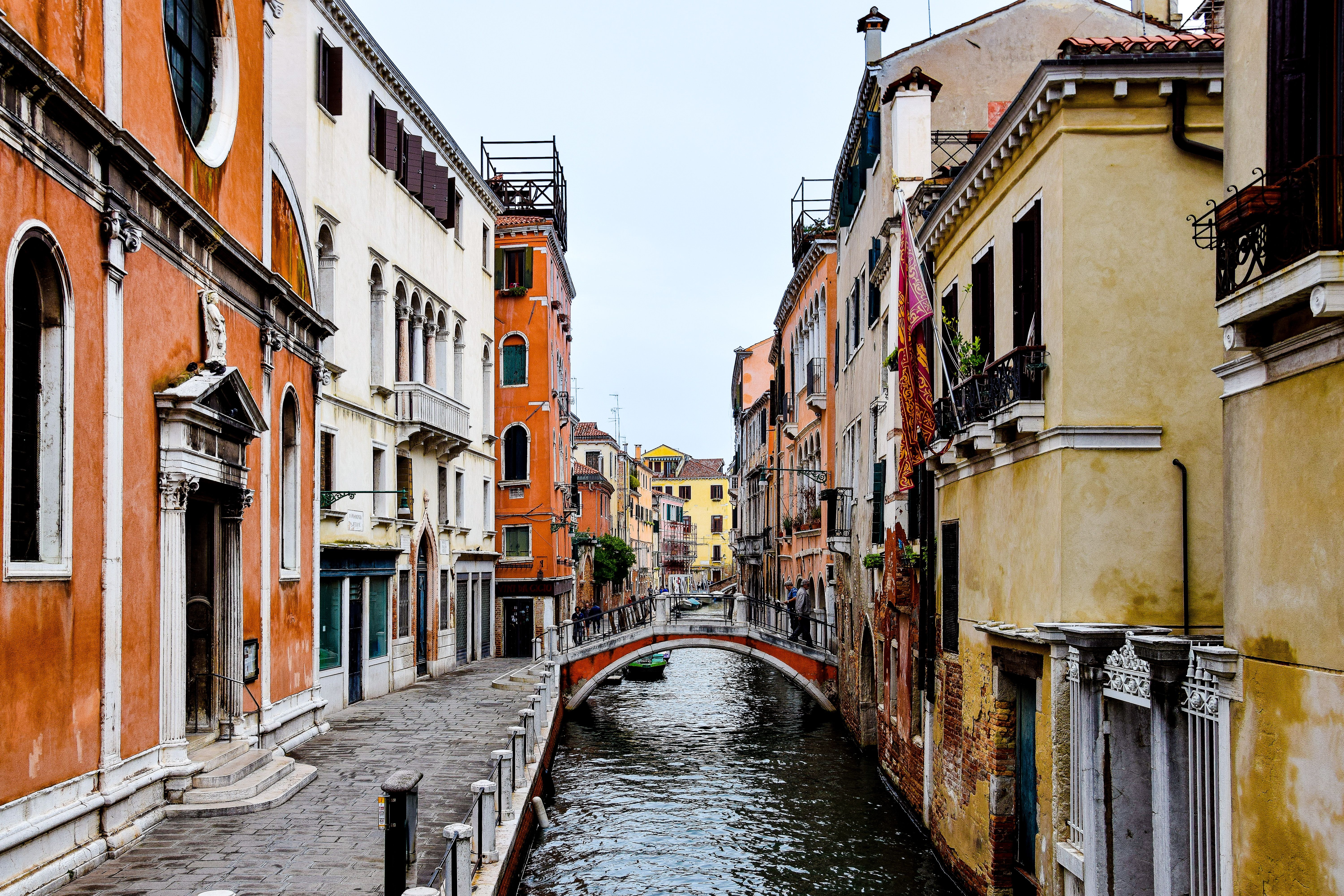 View of an Arch Bridge over the Canal and Houses in Venice, Italy ...