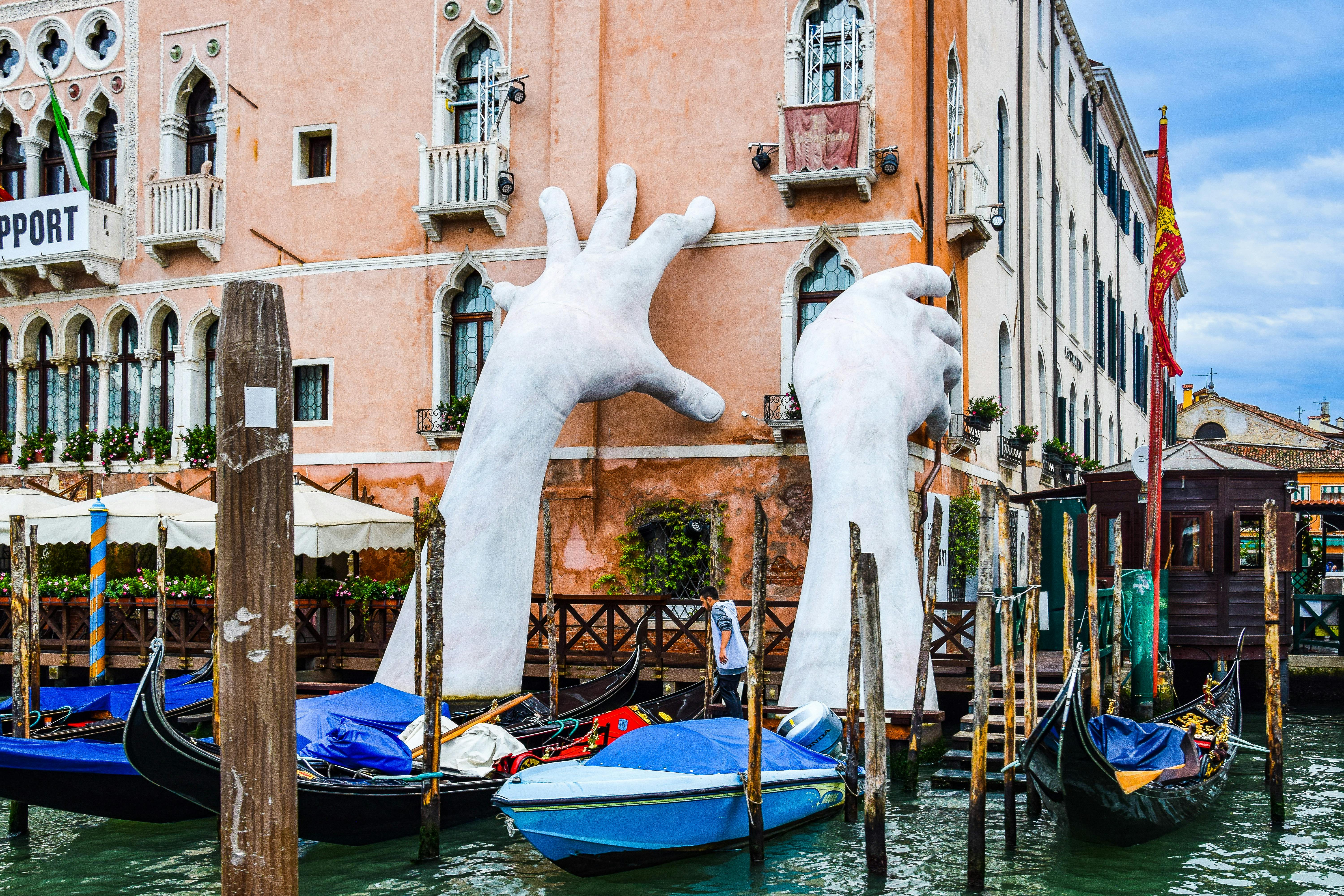 Sculpture of Giant Hands Outside of the Palazzo Morosini Sagredo in ...