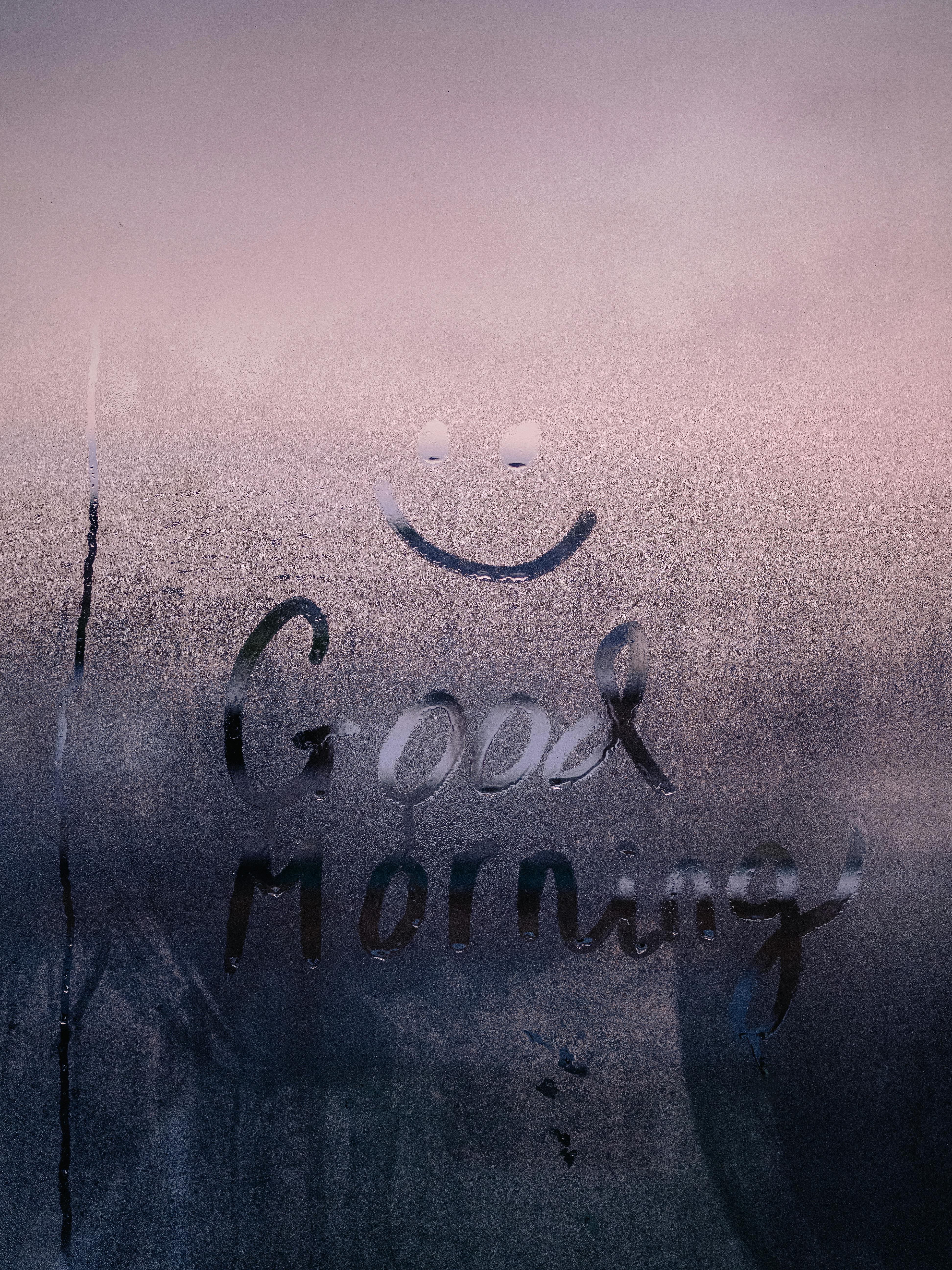 Smiley Face and Good Morning Text Painted on a Foggy Window · Free ...