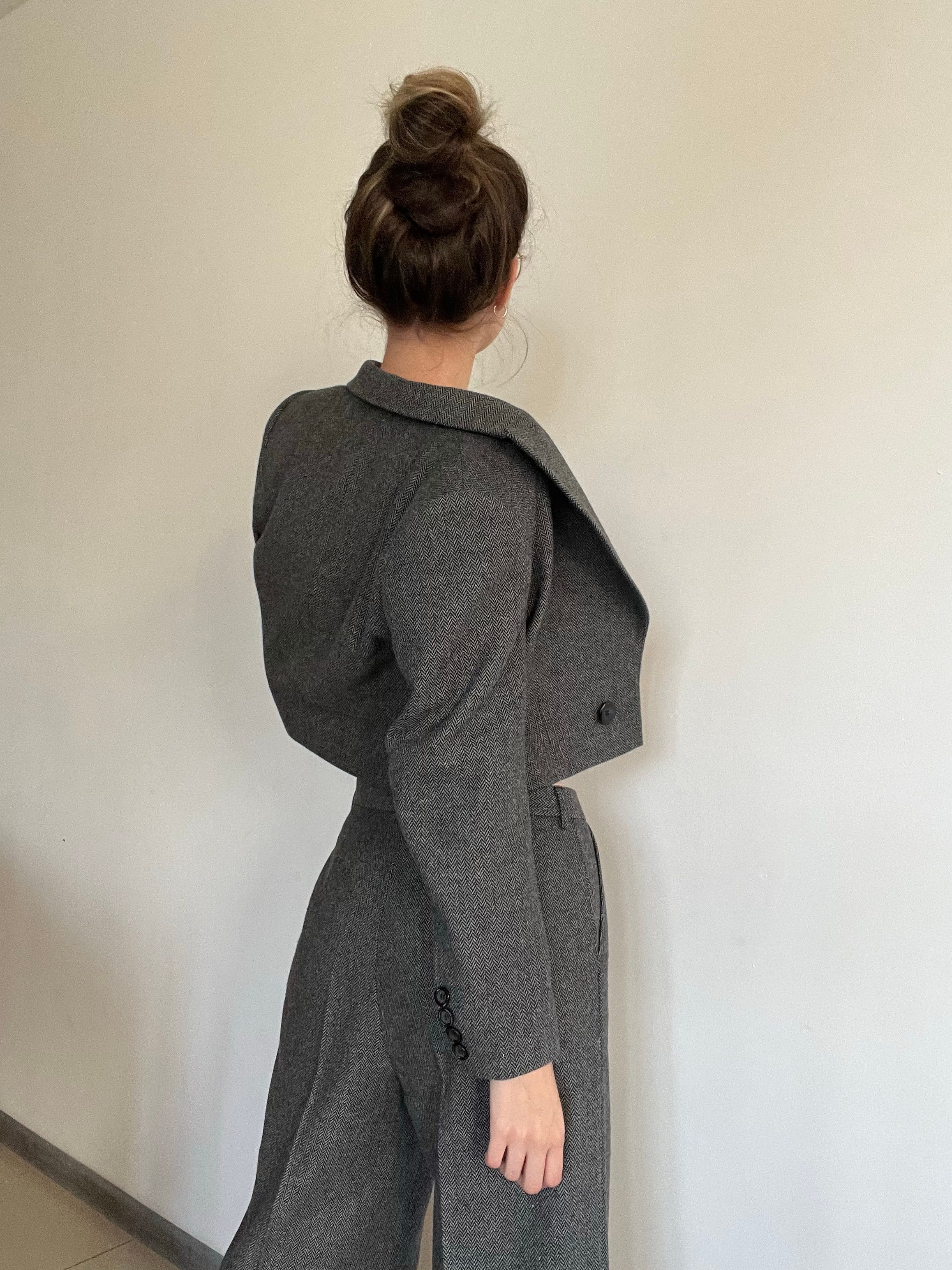 Back View of a Woman Posing on a Rooftop · Free Stock Photo