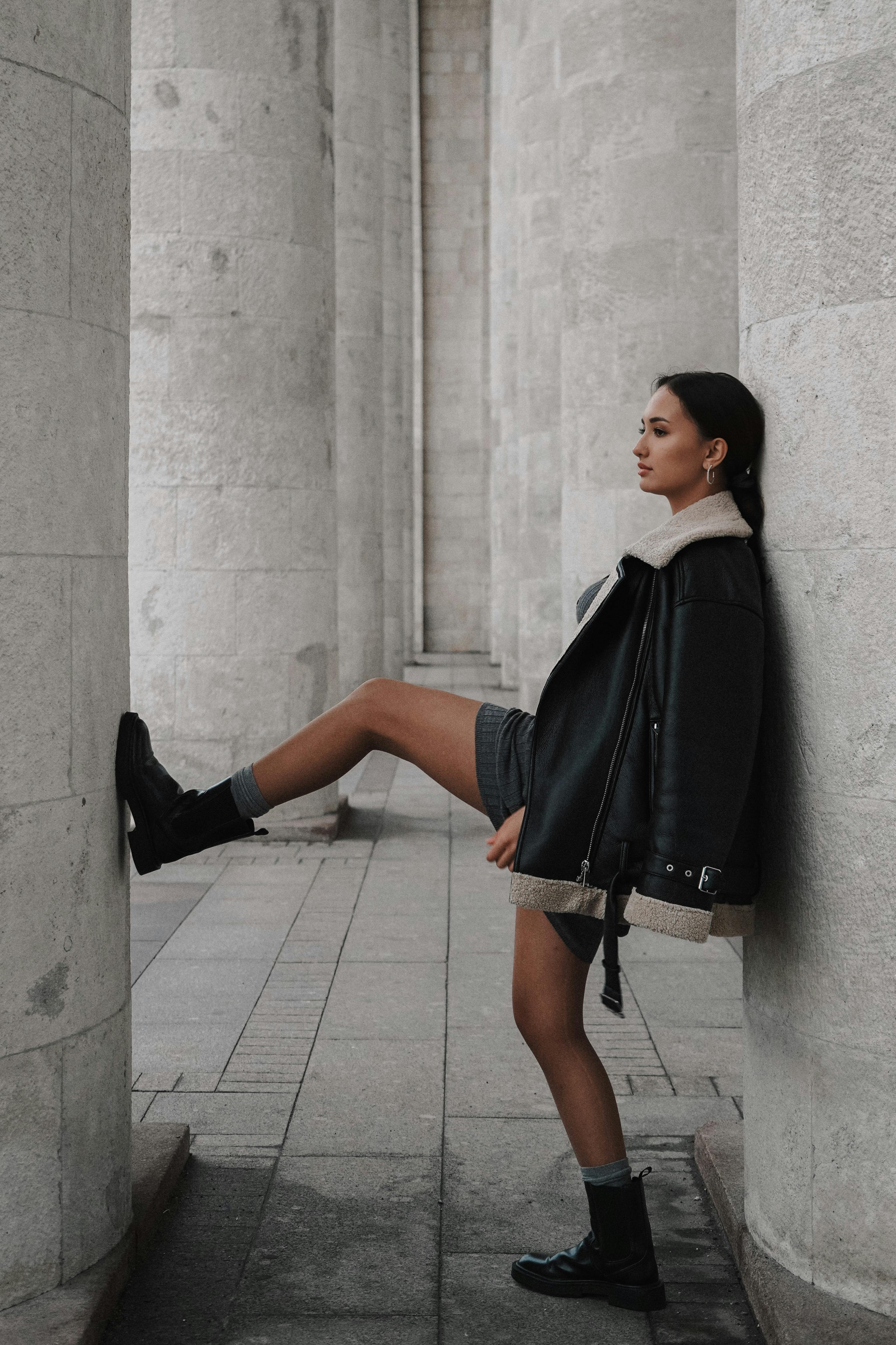Woman Posing Among Columns · Free Stock Photo
