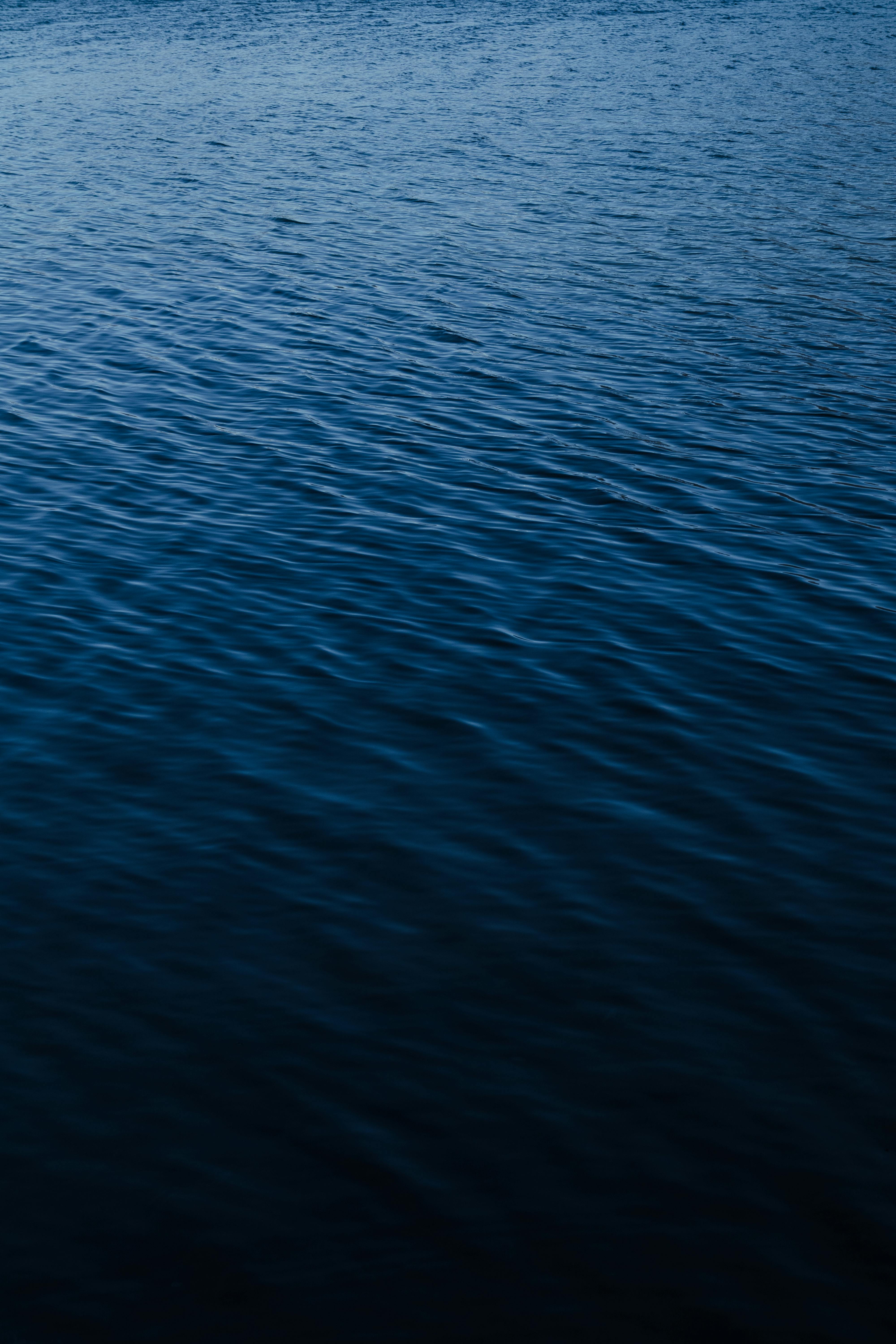 View of Dark Blue Water Surface · Free Stock Photo