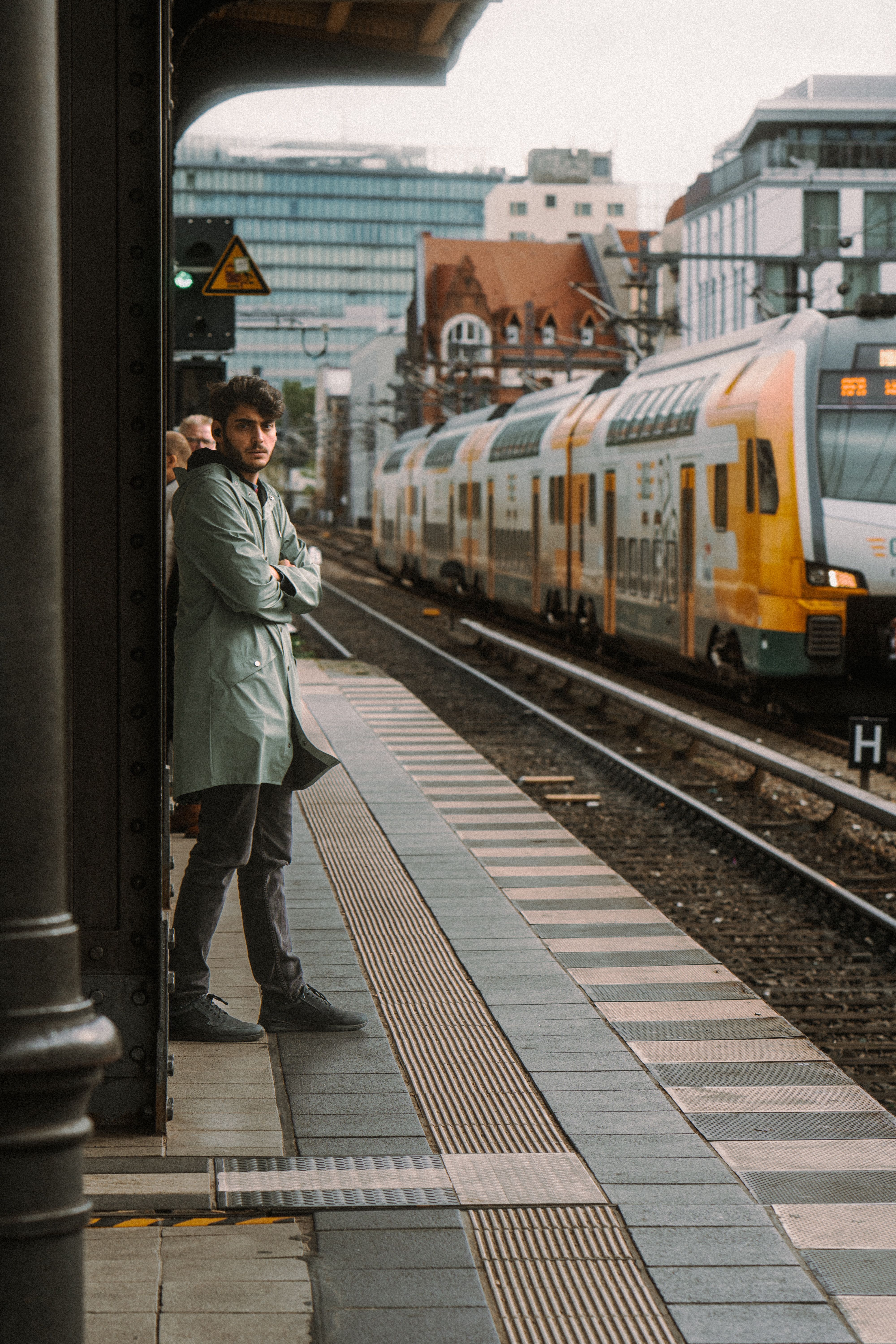 Man Standing on Platform on Train Station · Free Stock Photo