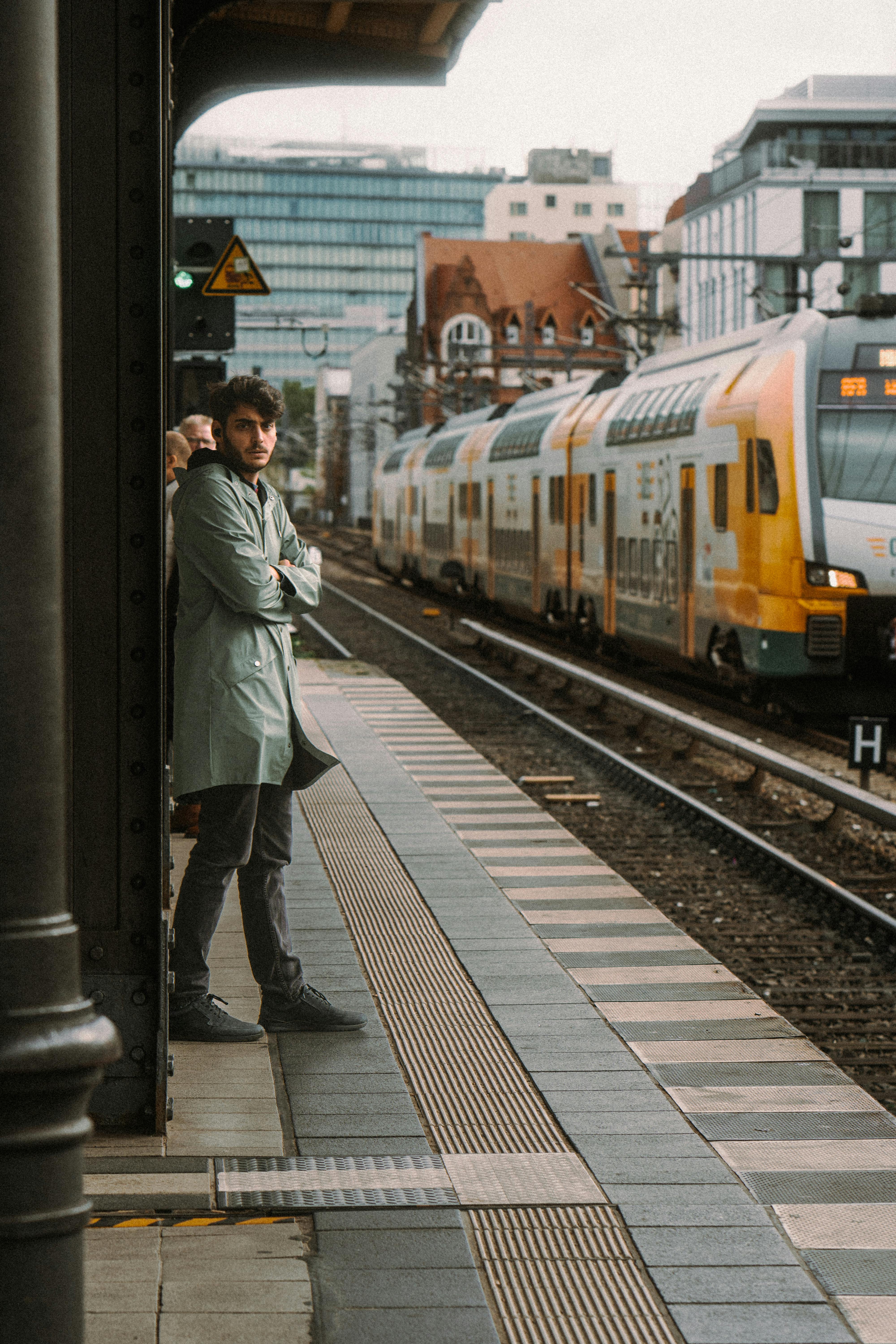 Man Standing on Platform on Train Station · Free Stock Photo