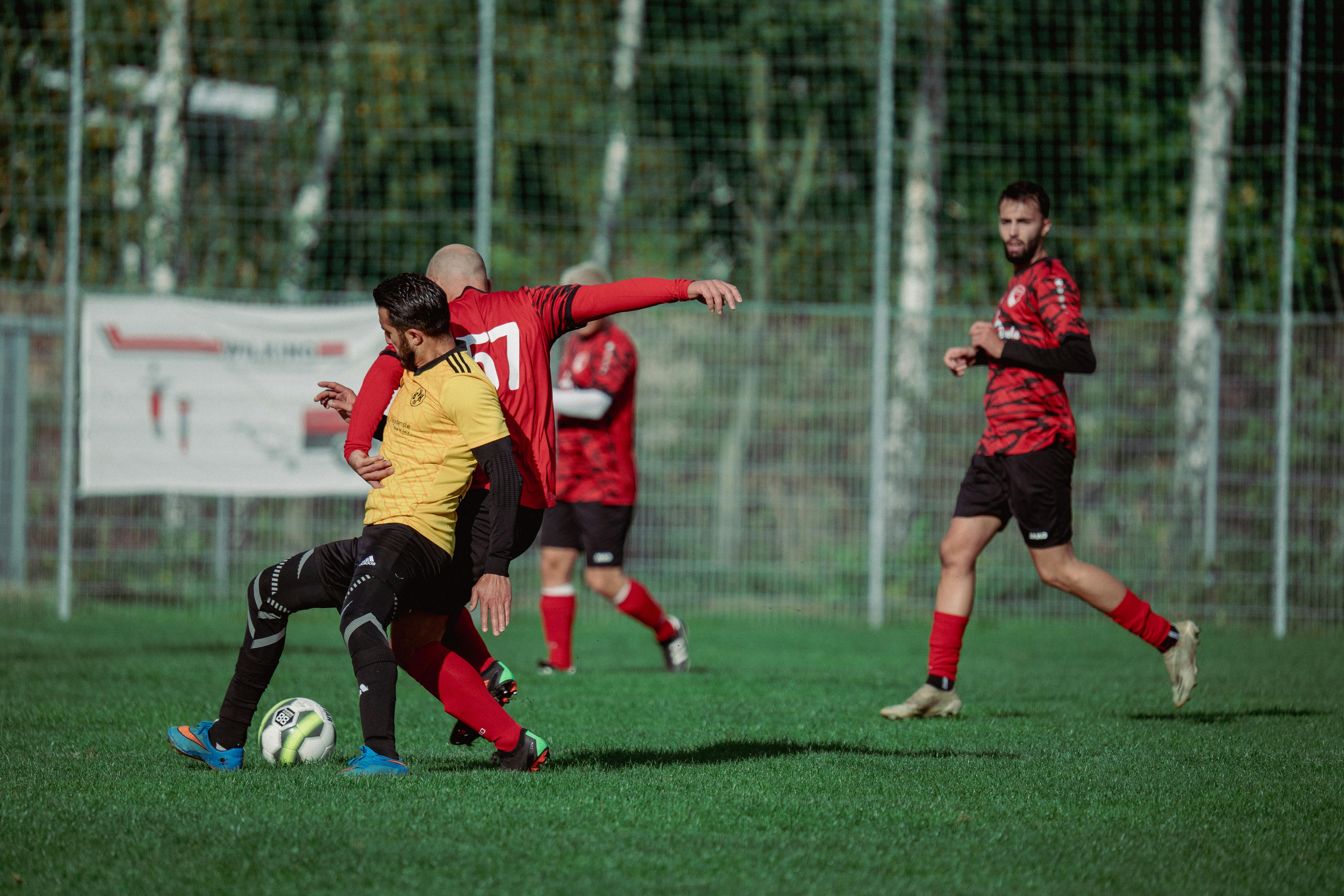 Soccerball on Wide Green Grass Field · Free Stock Photo