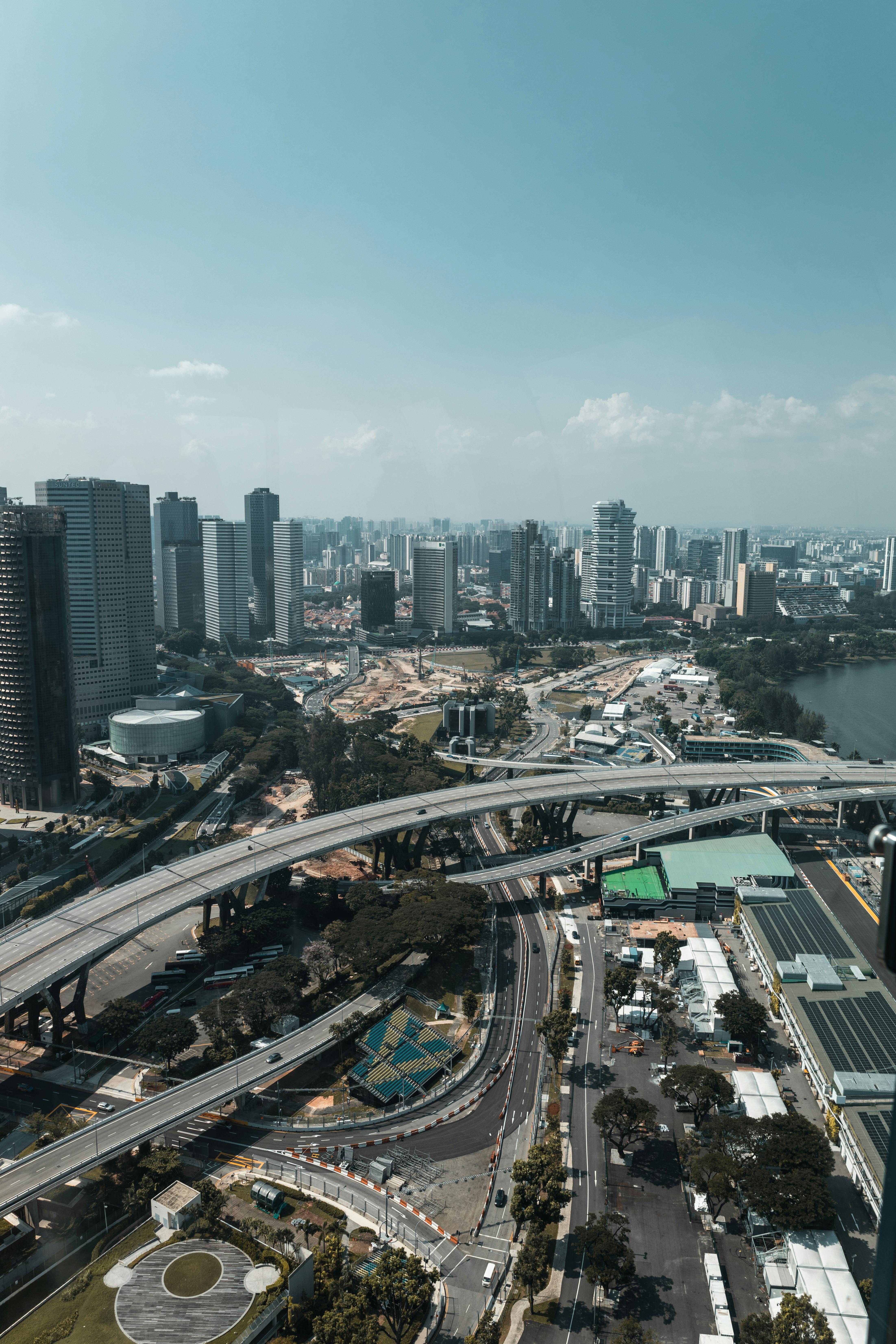 Aerial View of a Modern City with Elevated Roads · Free Stock Photo