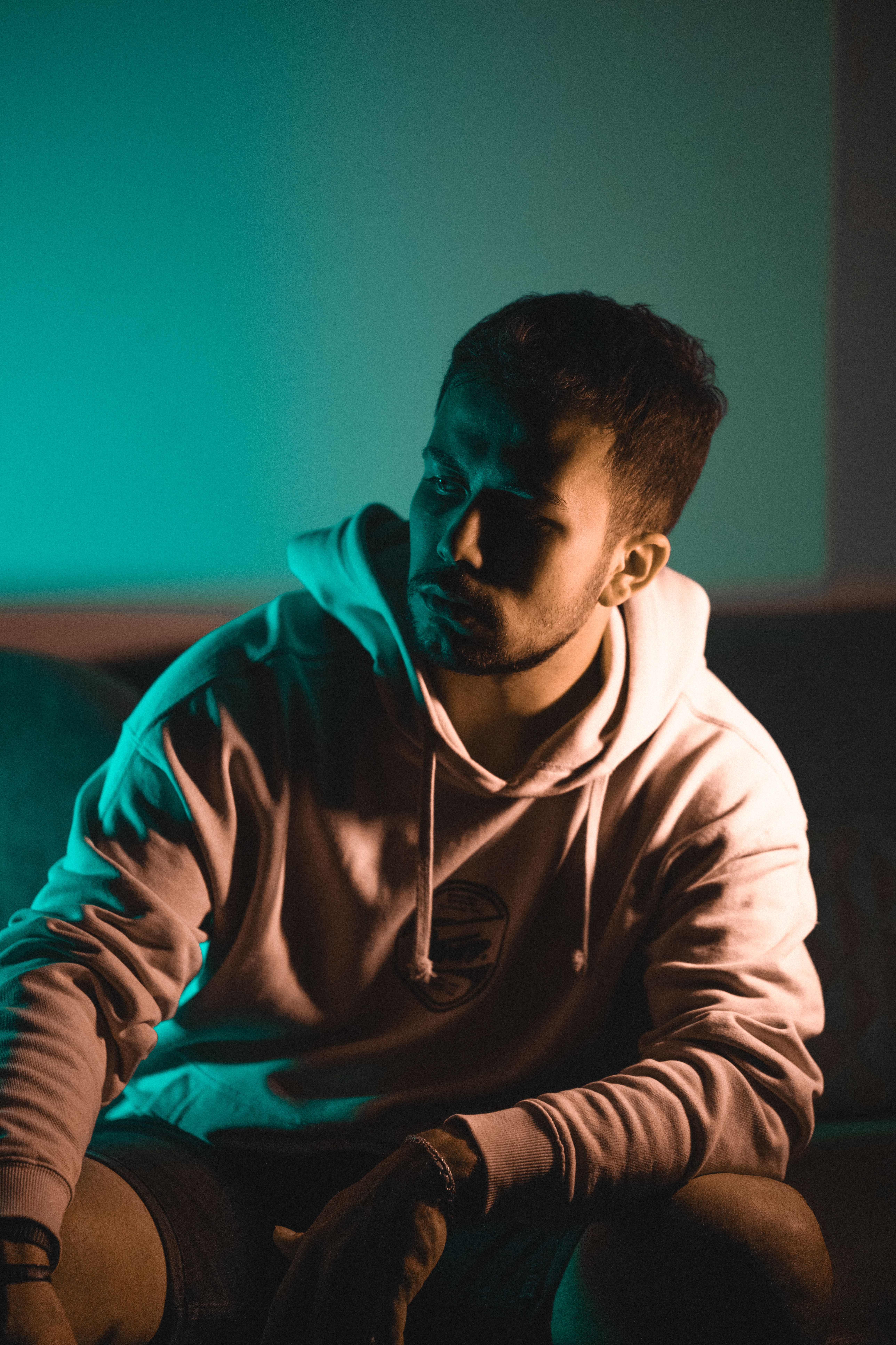 Portrait of Man Wearing Jumper in a Shadow · Free Stock Photo