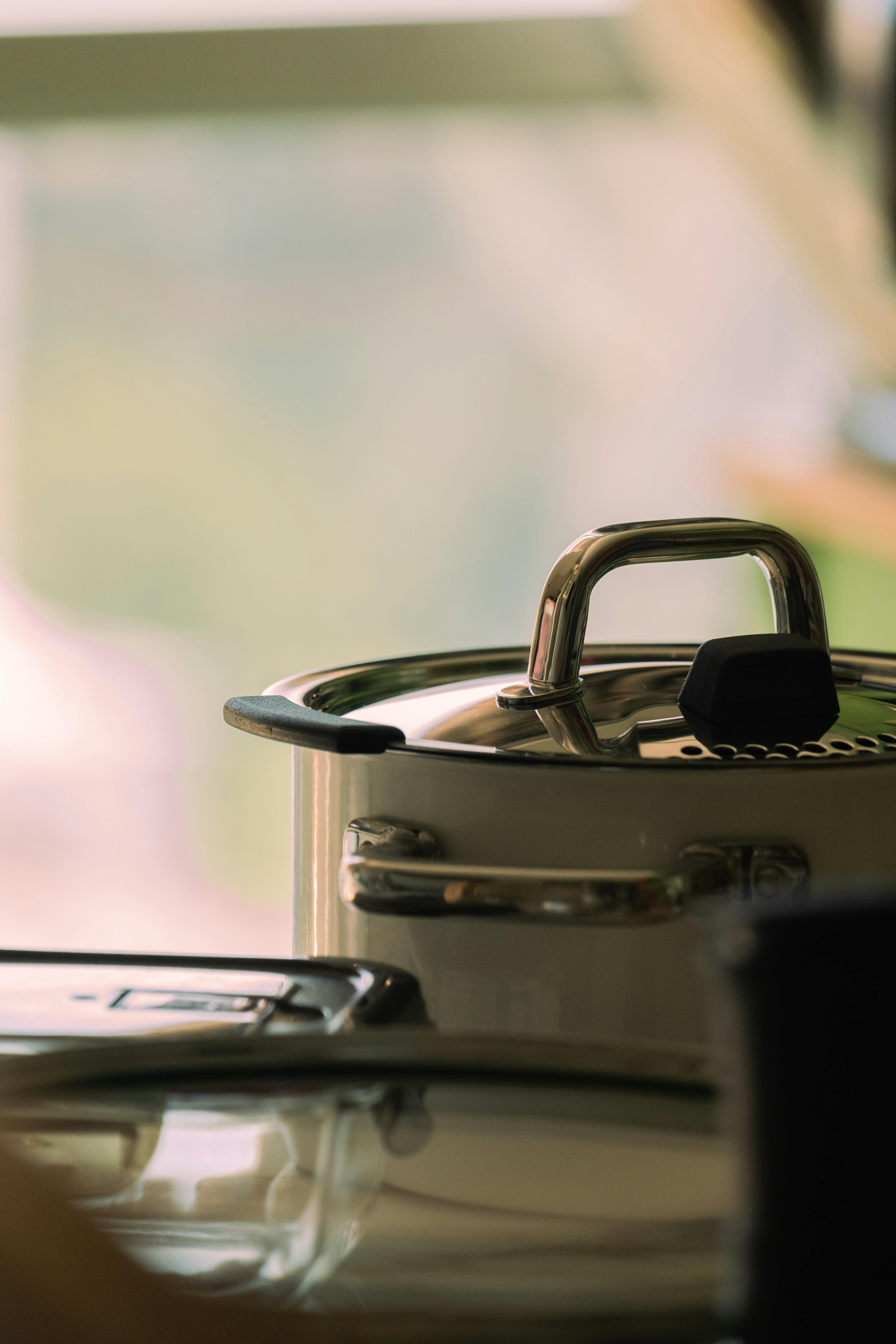Brown Lidded Cooking Pot on Gray Round Wooden Coaster · Free Stock Photo