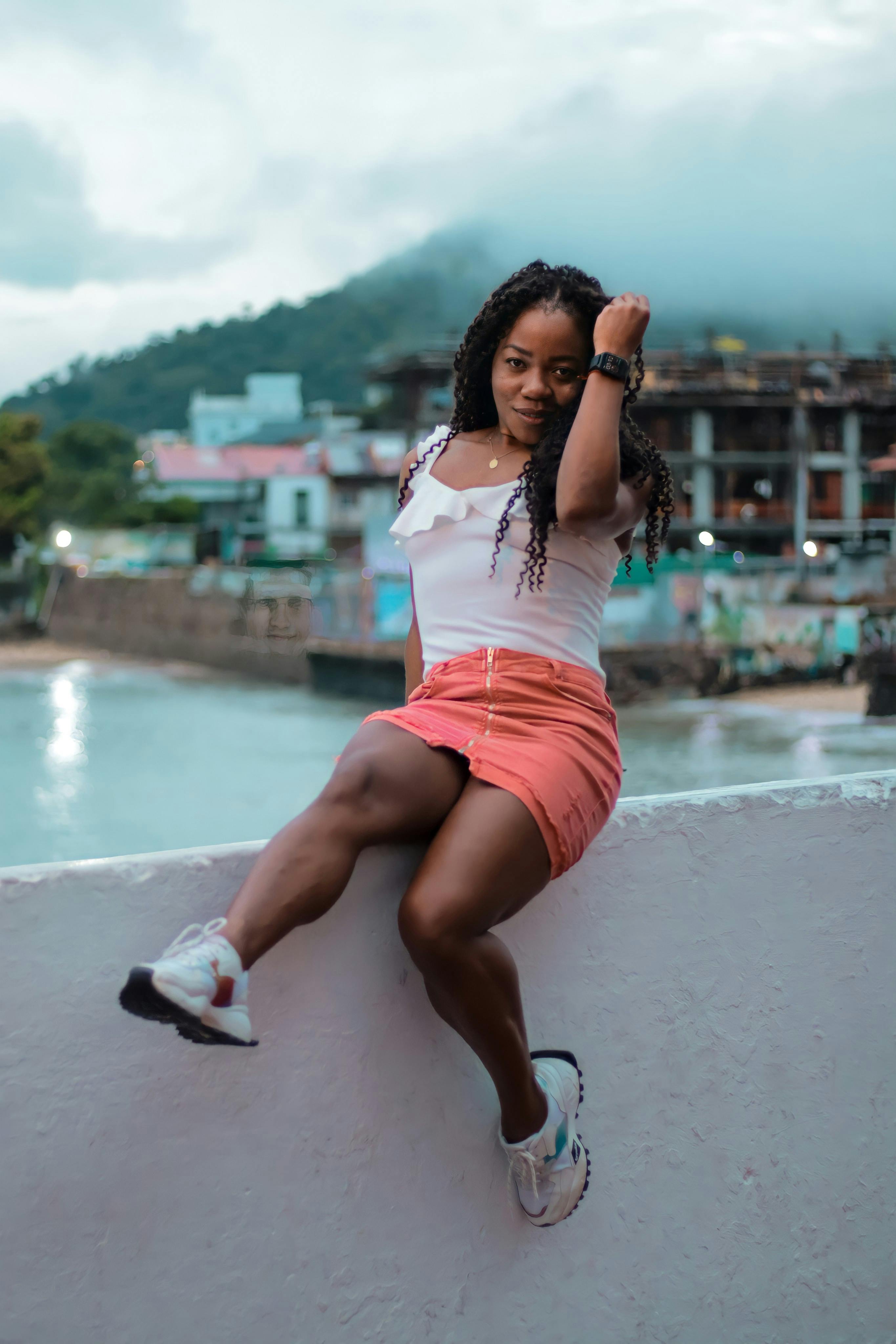 Smiling Woman with Purple Hair Posing in Mini and Over The Knee Boots ...