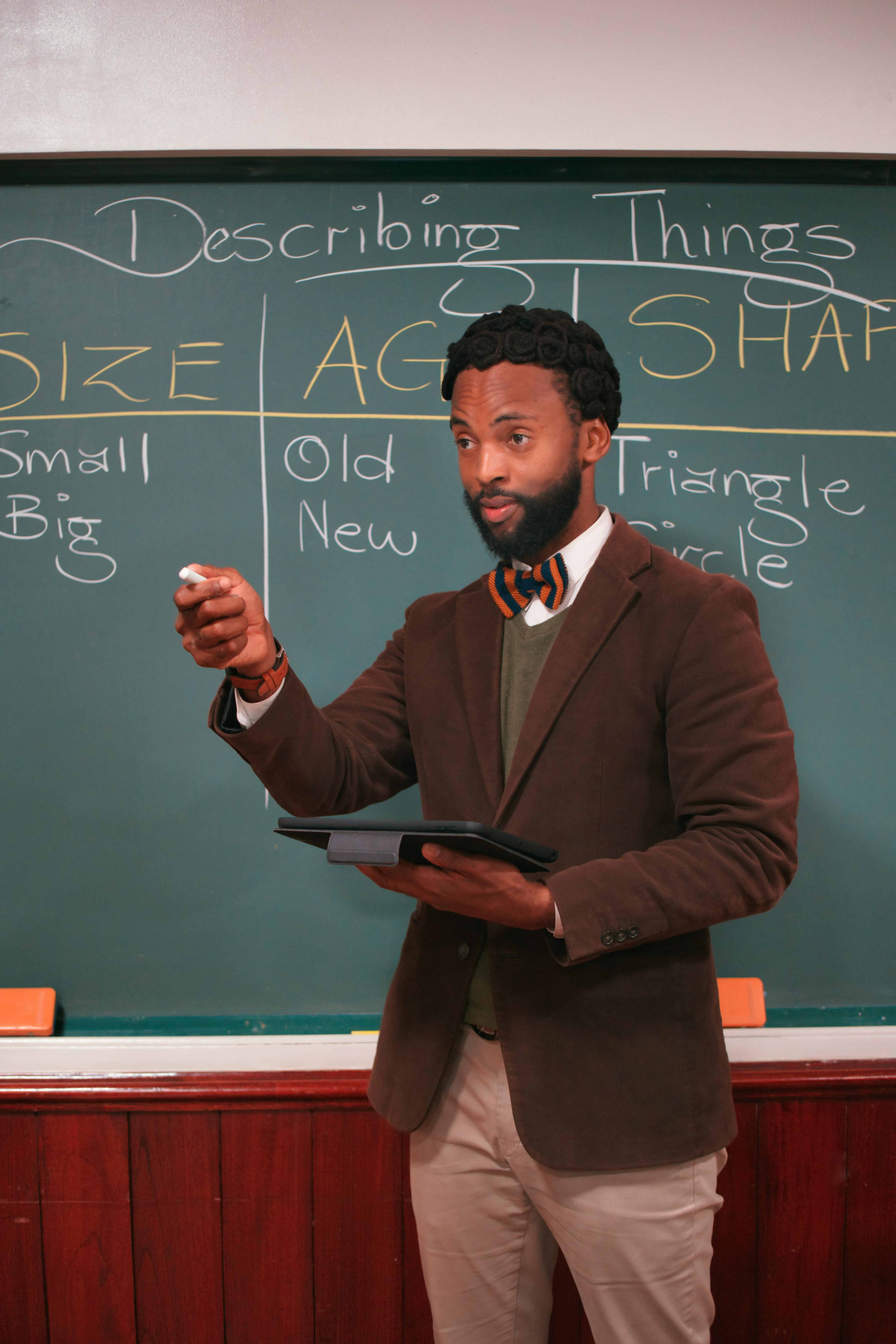 A Teacher Standing in front of His Class · Free Stock Photo