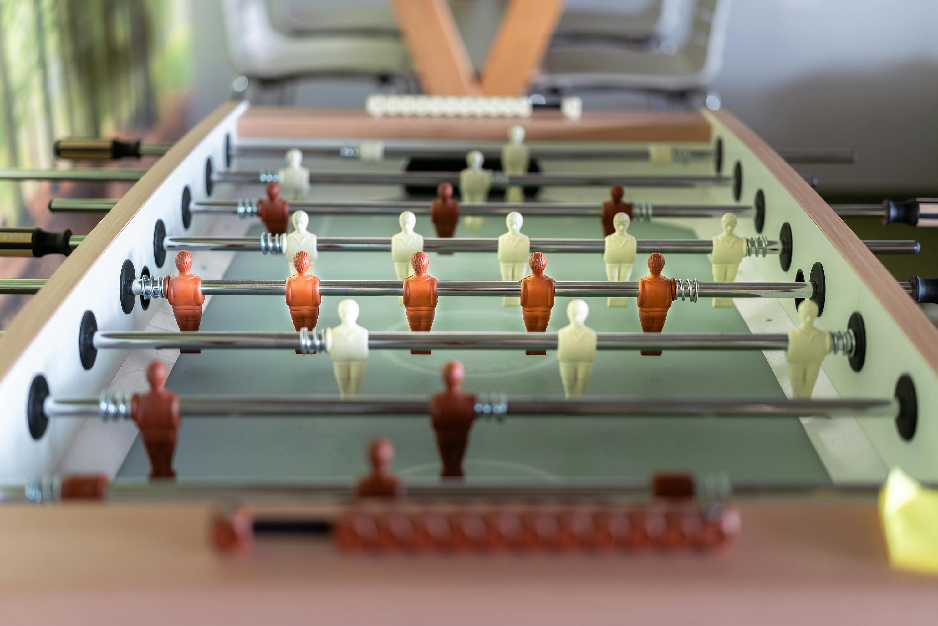 Bars with Pawns on Table Football · Free Stock Photo