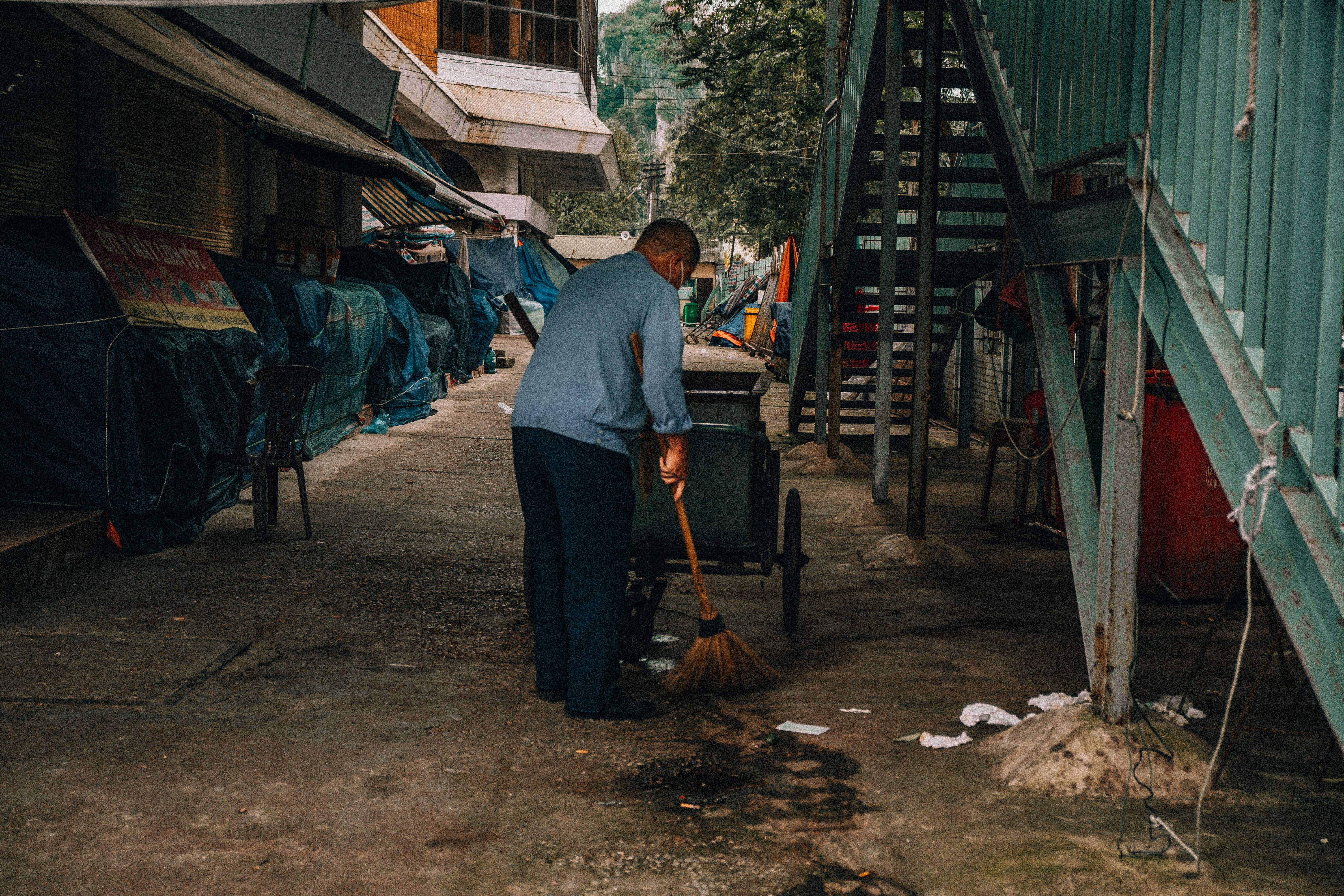 Man Cleaning the Street in City · Free Stock Photo