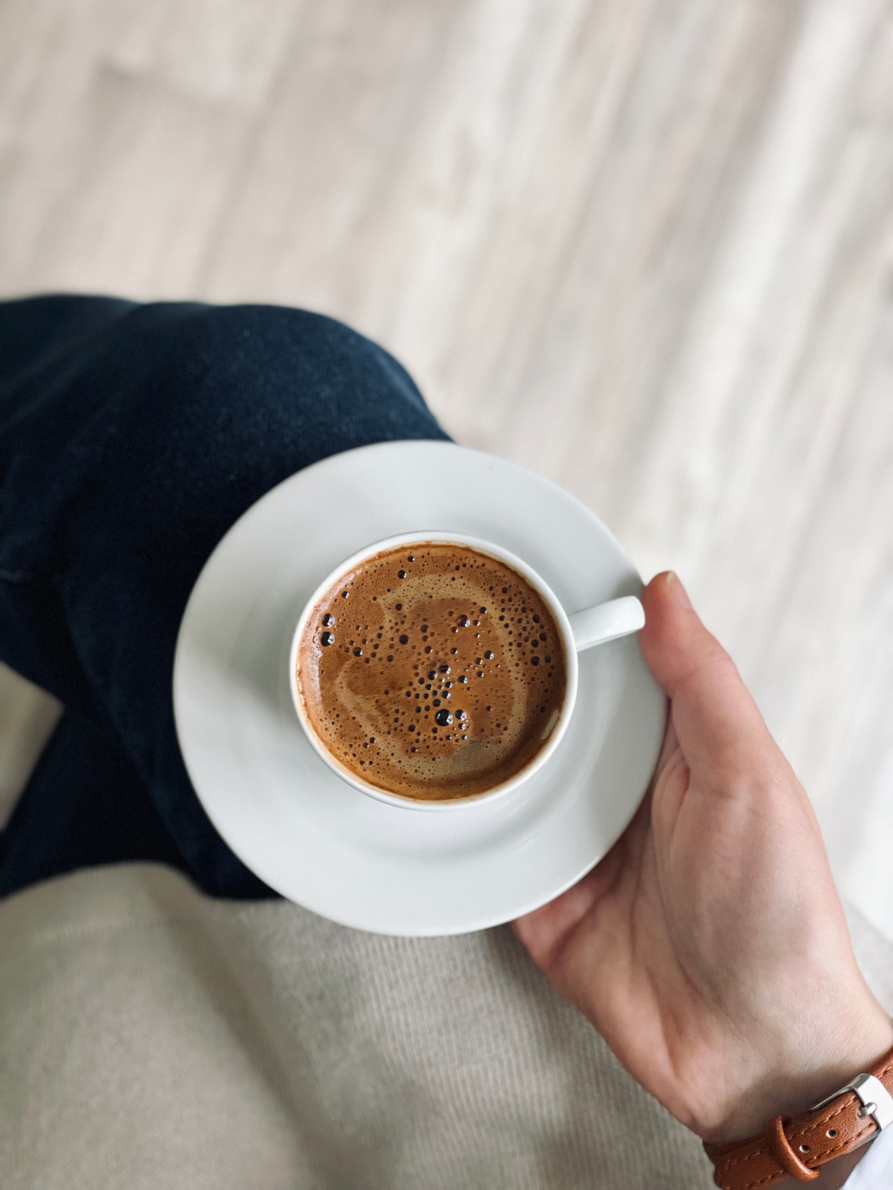 Photo of Man Holding a Red Nescafe Mug · Free Stock Photo