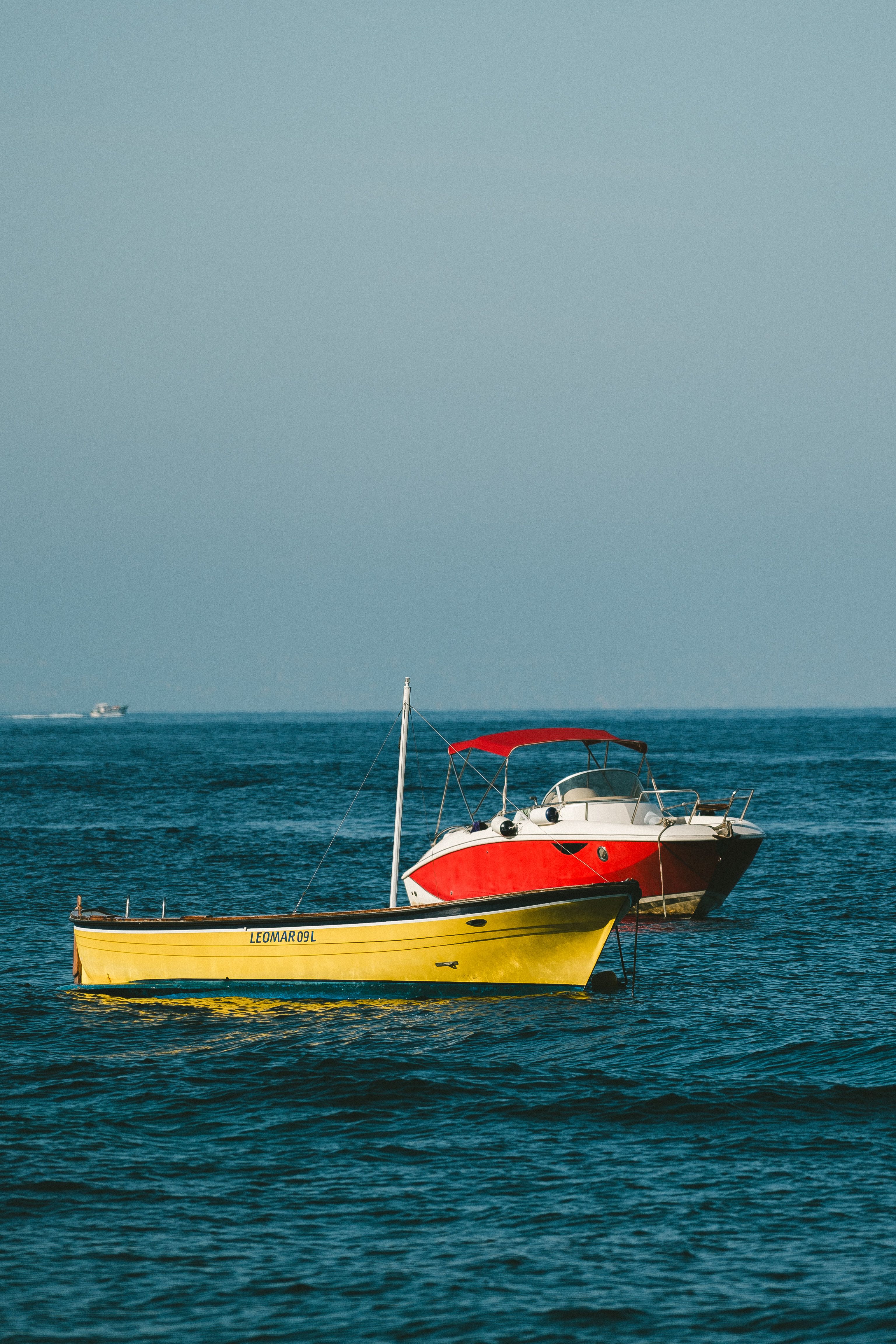 View of Empty Boats on a Sea near the Shore · Free Stock Photo