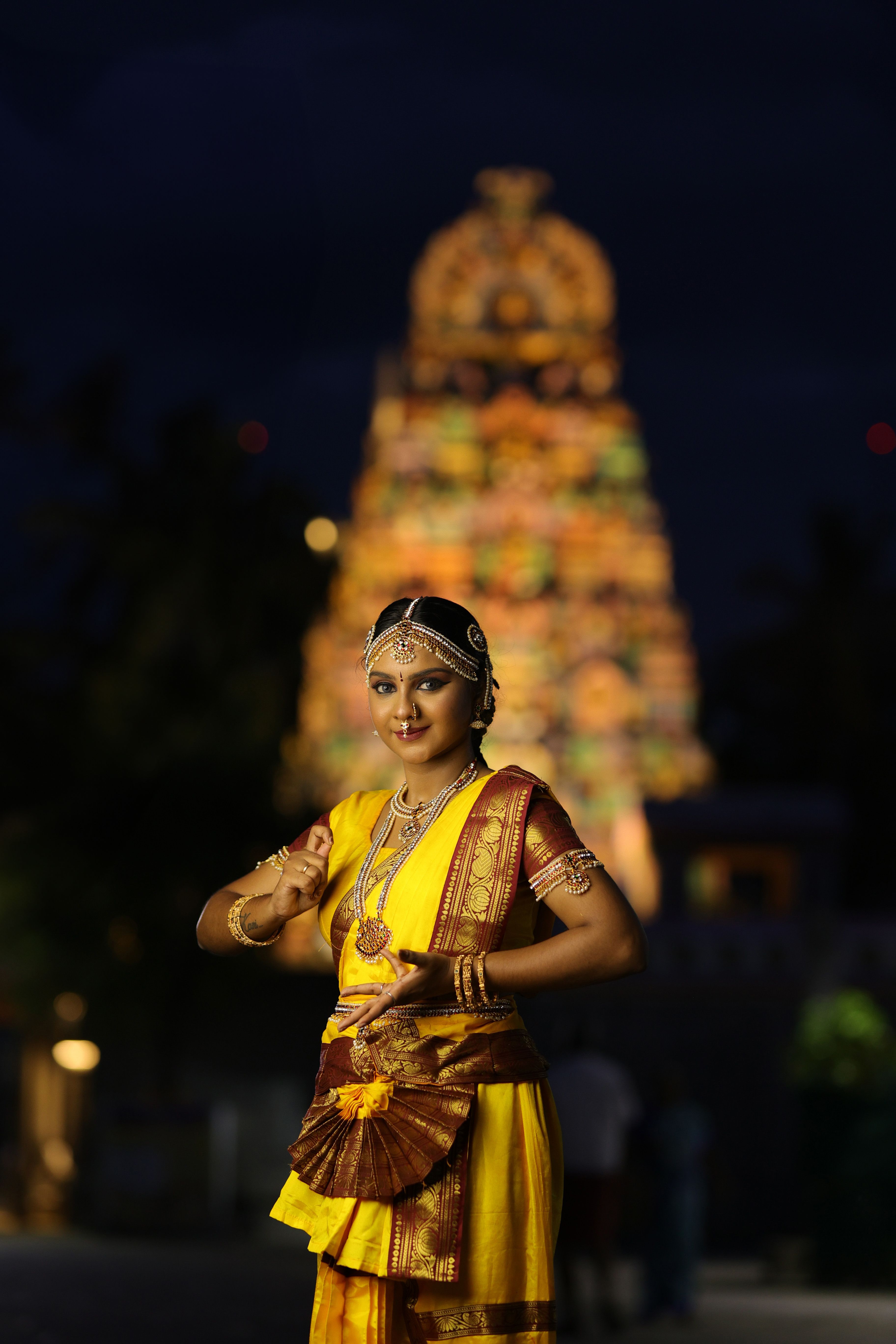 A Woman in Gold Saree Dancing a Traditional Dance · Free Stock Photo