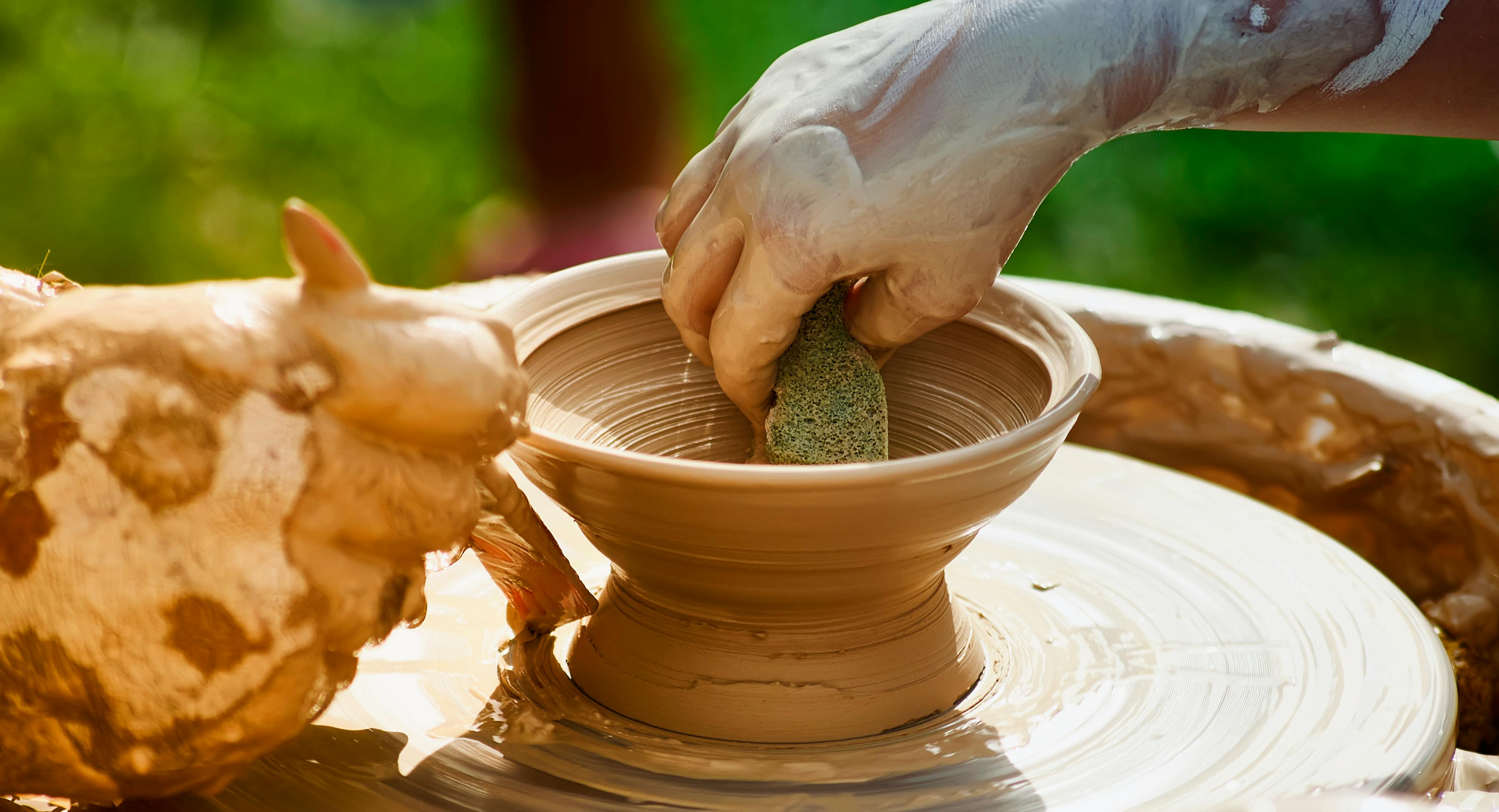 Close-up of a Person Making Pottery · Free Stock Photo
