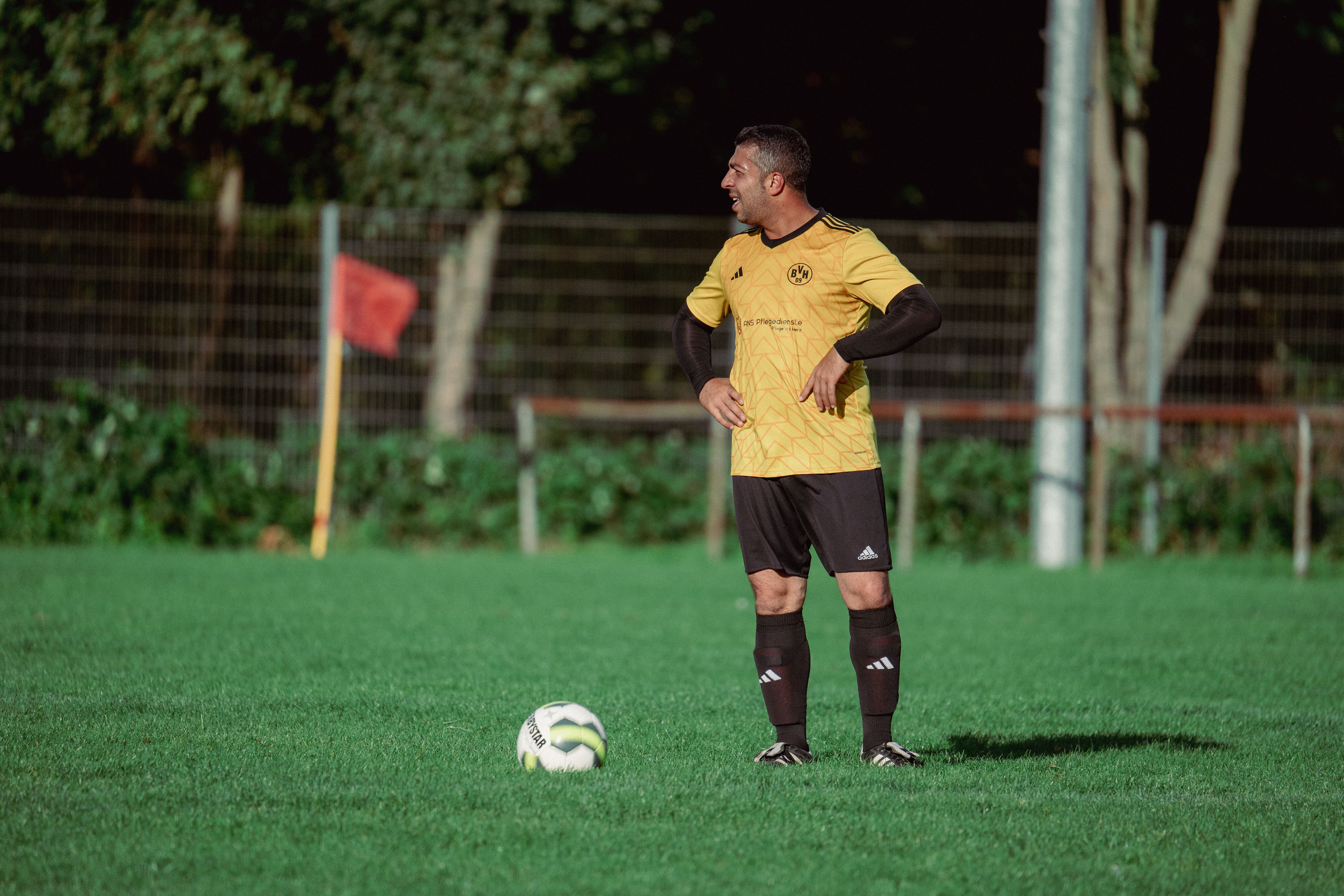 Man Playing Football on a Field · Free Stock Photo