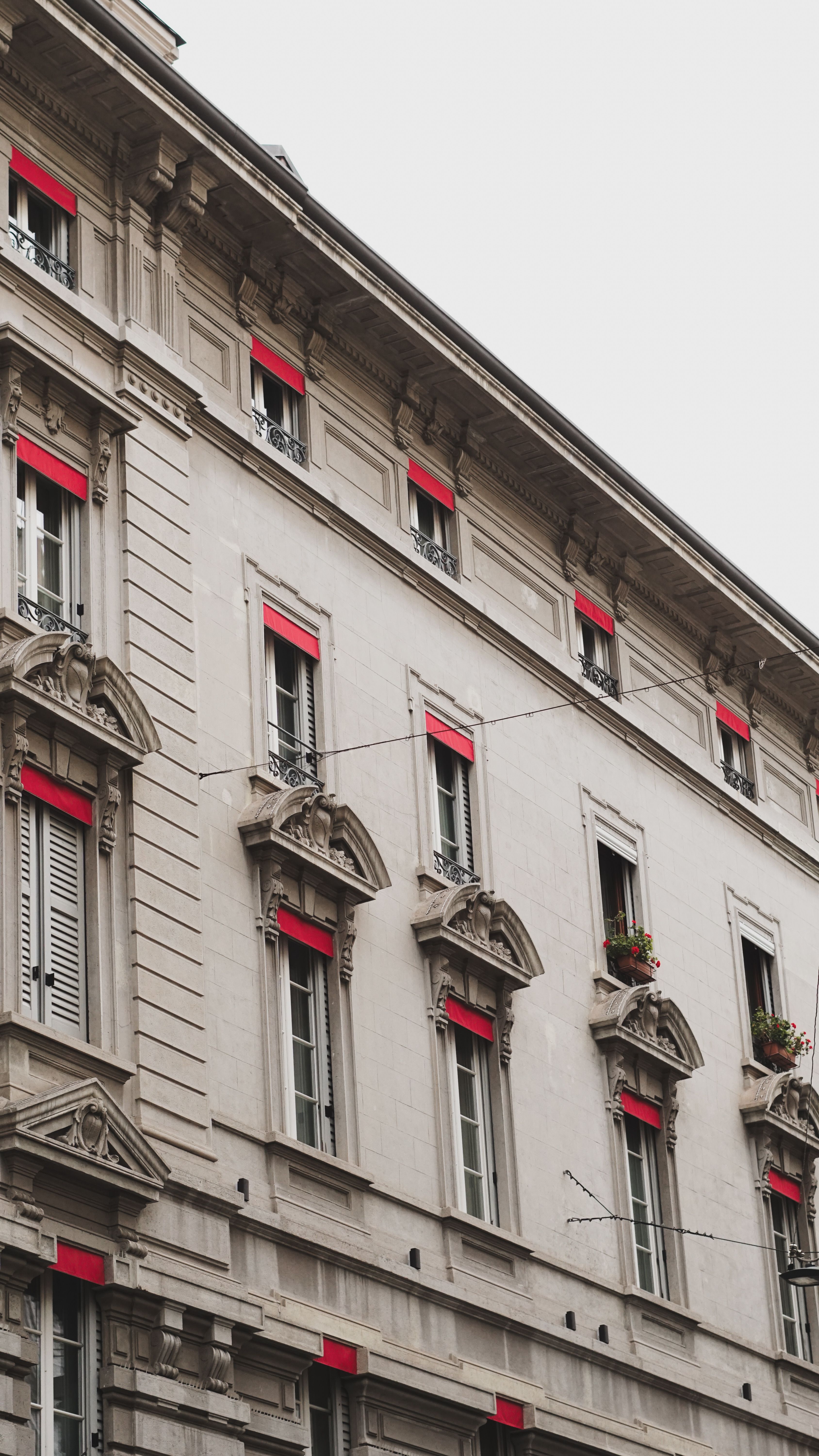 A building with red curtains on it · Free Stock Photo