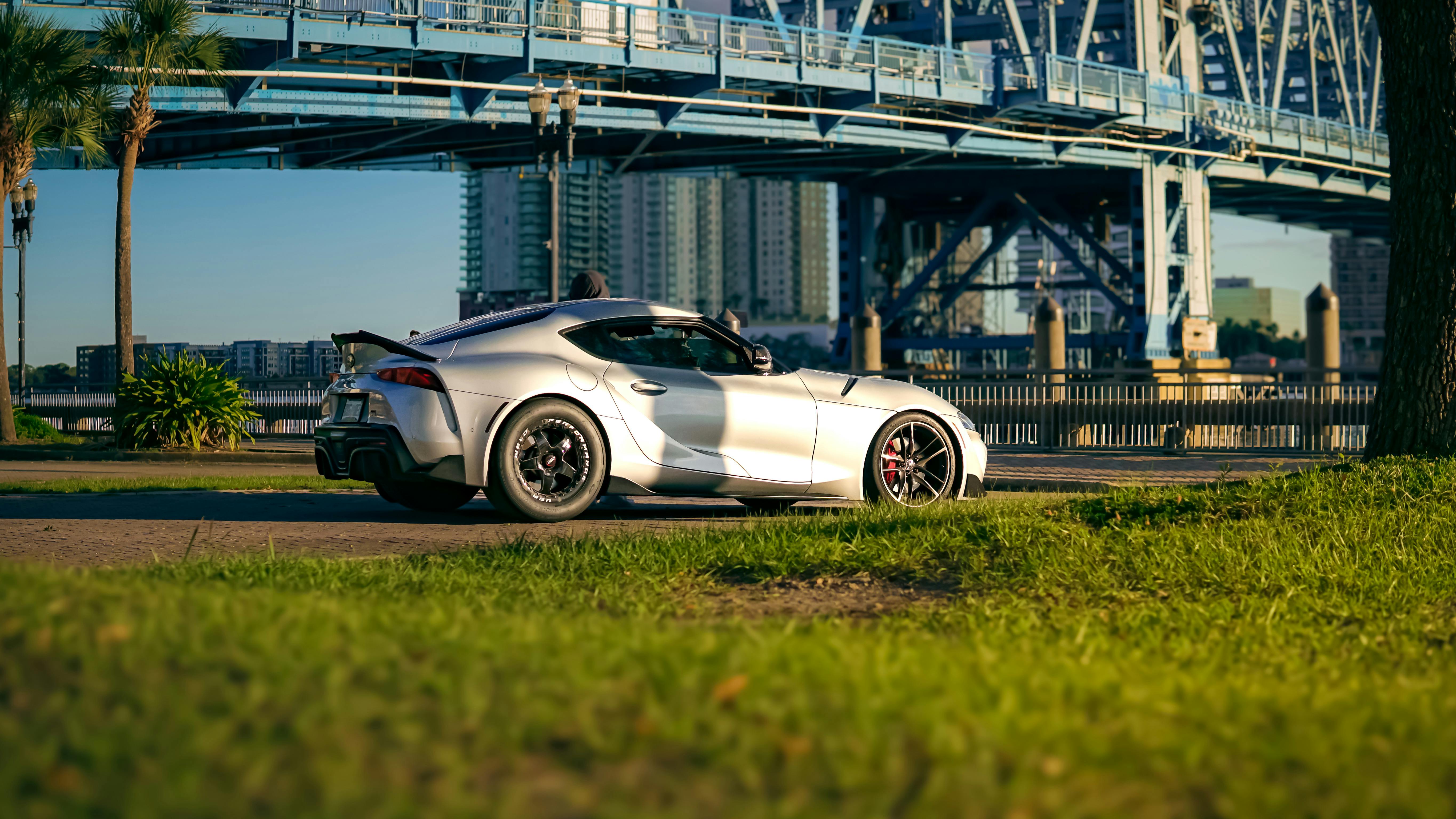 Silver Sport Car on a Road · Free Stock Photo