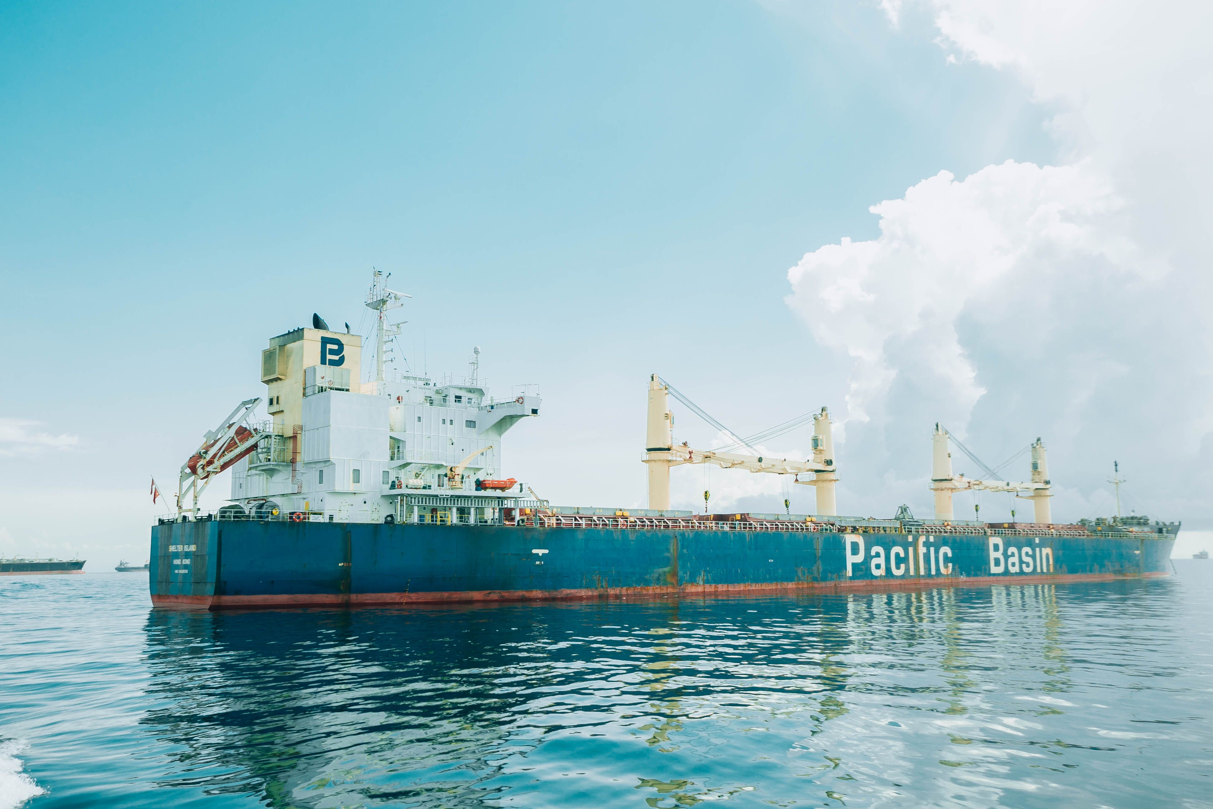 Cargo Ship under Blue Sky · Free Stock Photo